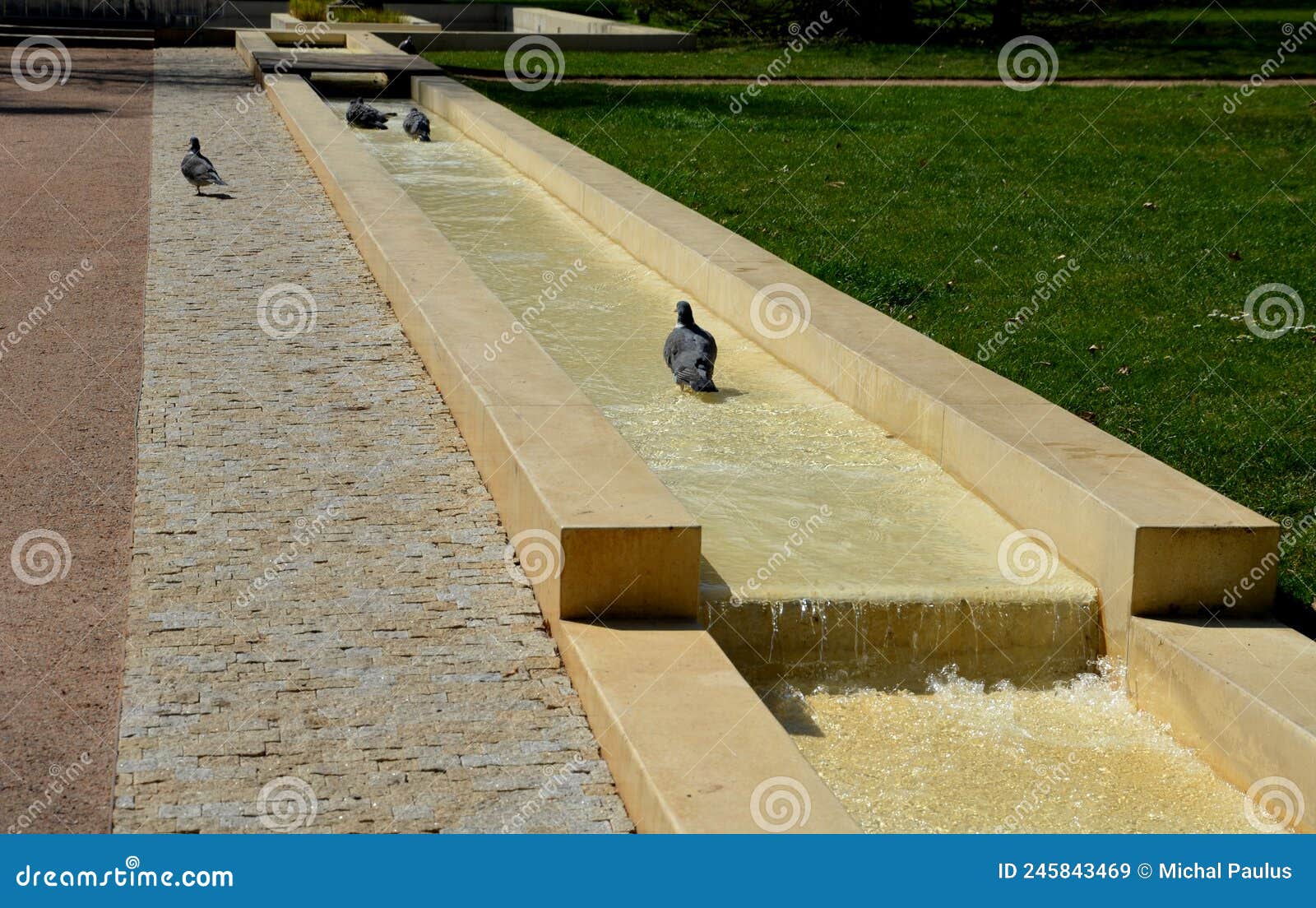 Promenade in the Park, an Artificial Stream in a Sunken Gutter on the ... Promenade in the Park, an Artificial Stream in a Sunken Gutter on the ...
