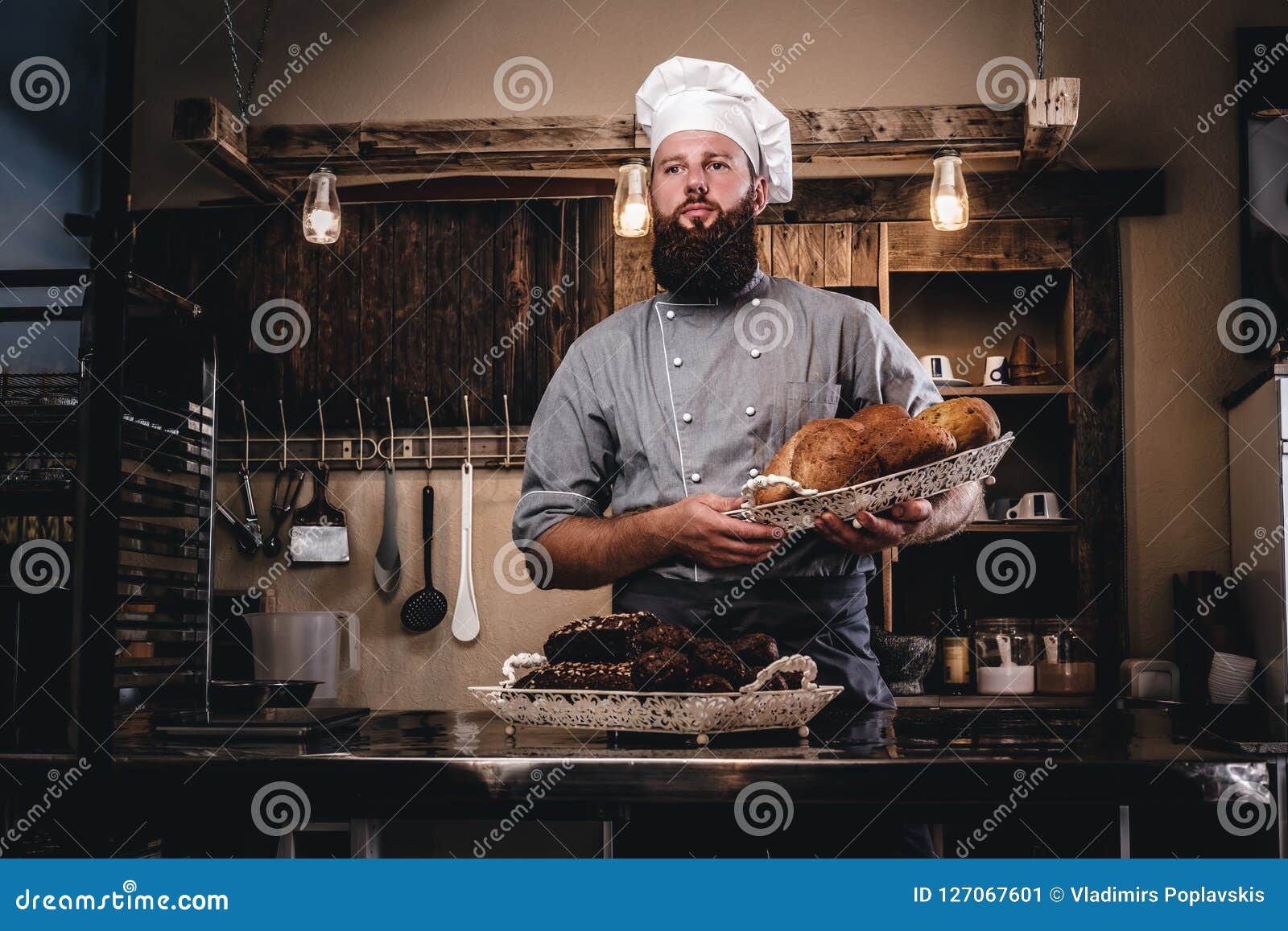 Handsome Bearded Chef in Uniform Showing Tray of Fresh Bread in the ...