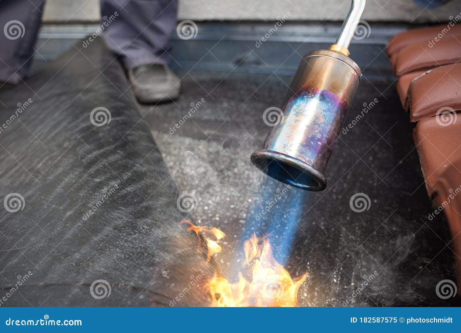 Propane Torch Heating Up Bitumen Roofing Felt Stock Image - Image of ...
