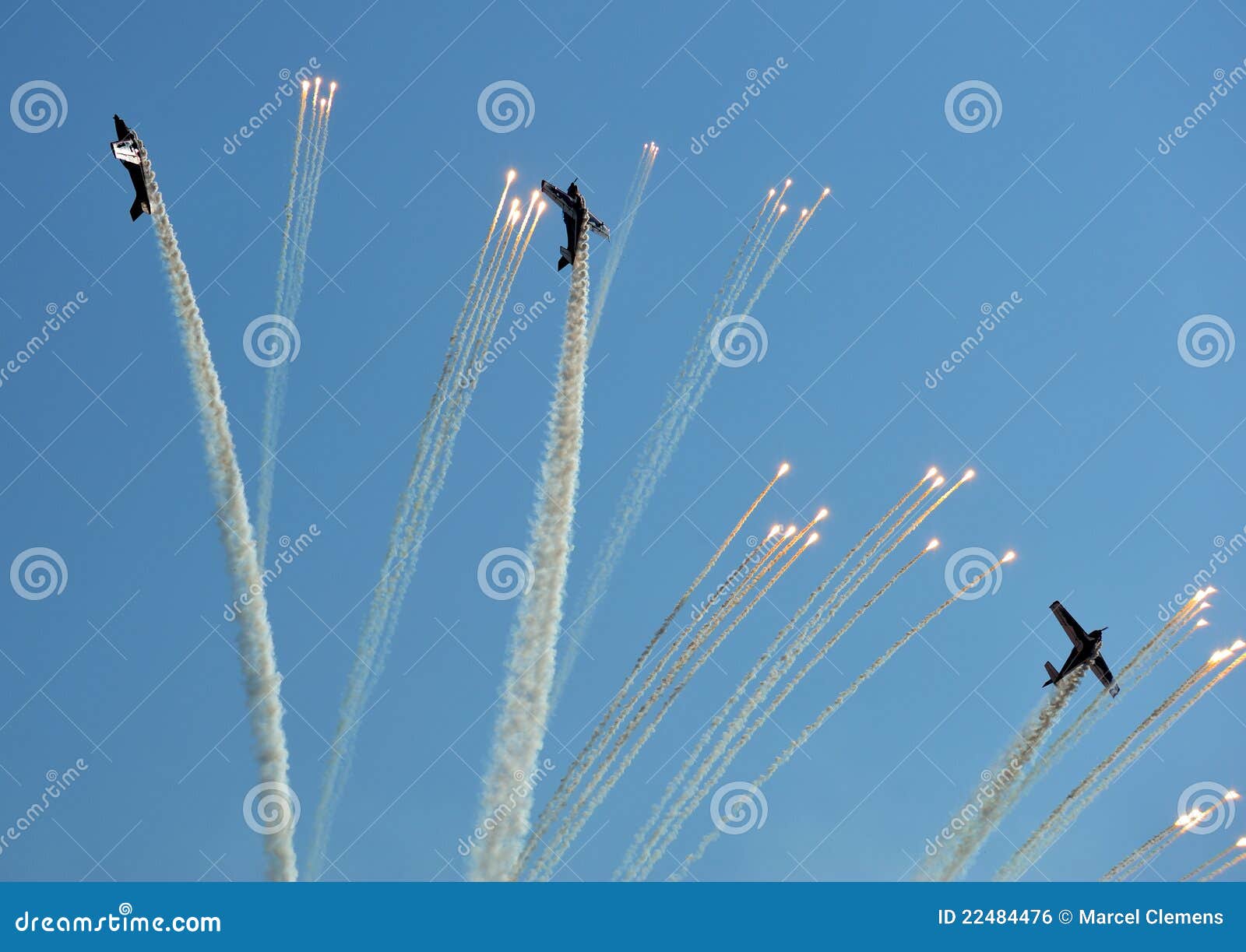 Propeller Planes Firing Flares during an Air Show Stock Photo - Image ...