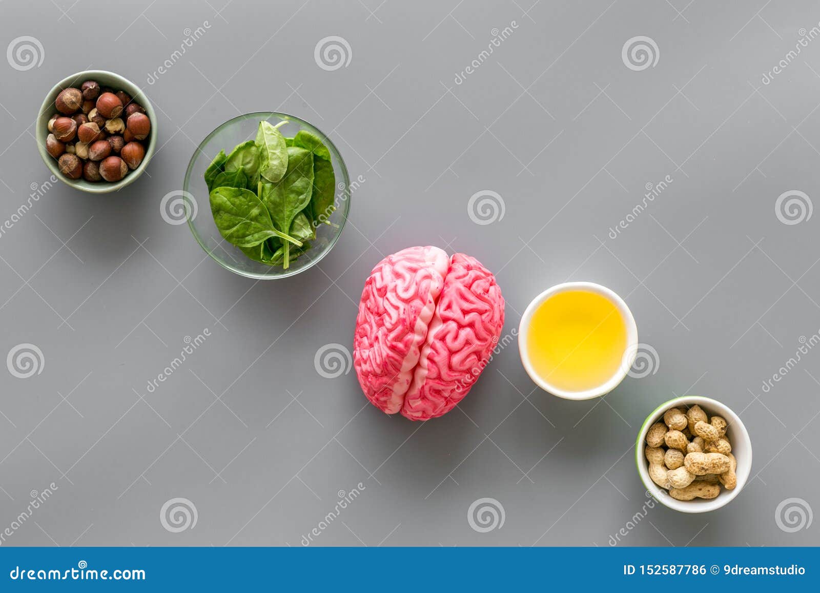 Proper Nutrition for Brain with Nuts, Spinage and Oil Stethoscope on ...