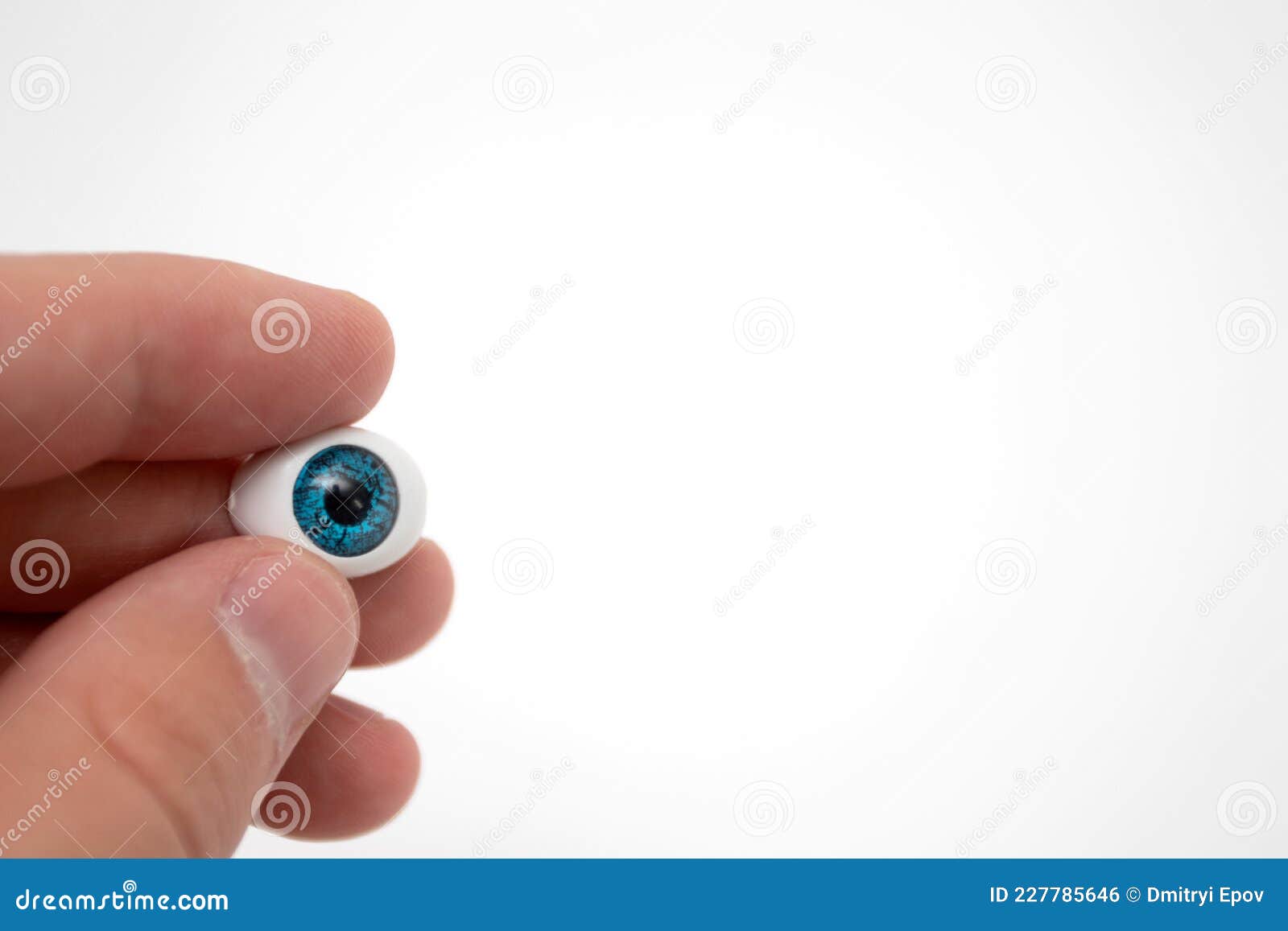 Prosthetic Eyeball in Hand on White Background Stock Photo - Image of ...