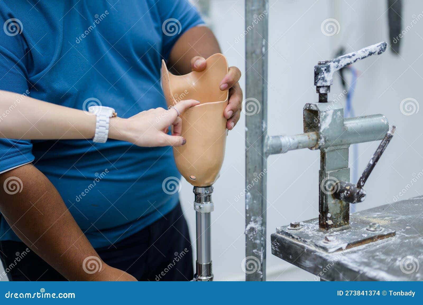 Prosthetic Technician Holding Prosthetic Leg Checking and Controlling ...