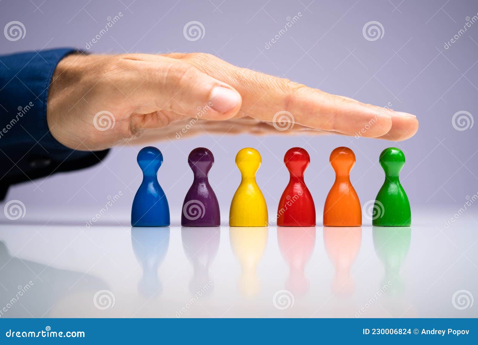 Protect Inclusion and Equality. Protect Colored Pawns Stock Photo ...
