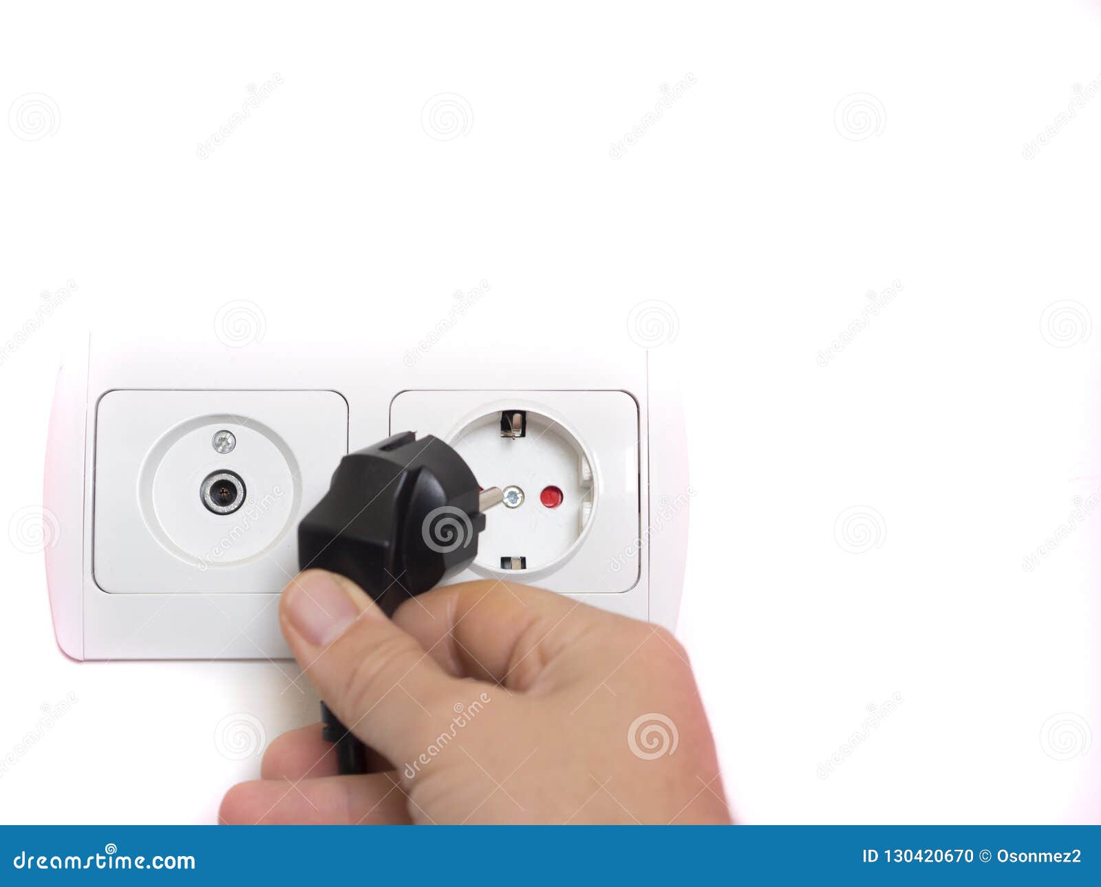 Protected Grounded Electrical Outlet on the Wall and Antenna Socket ...