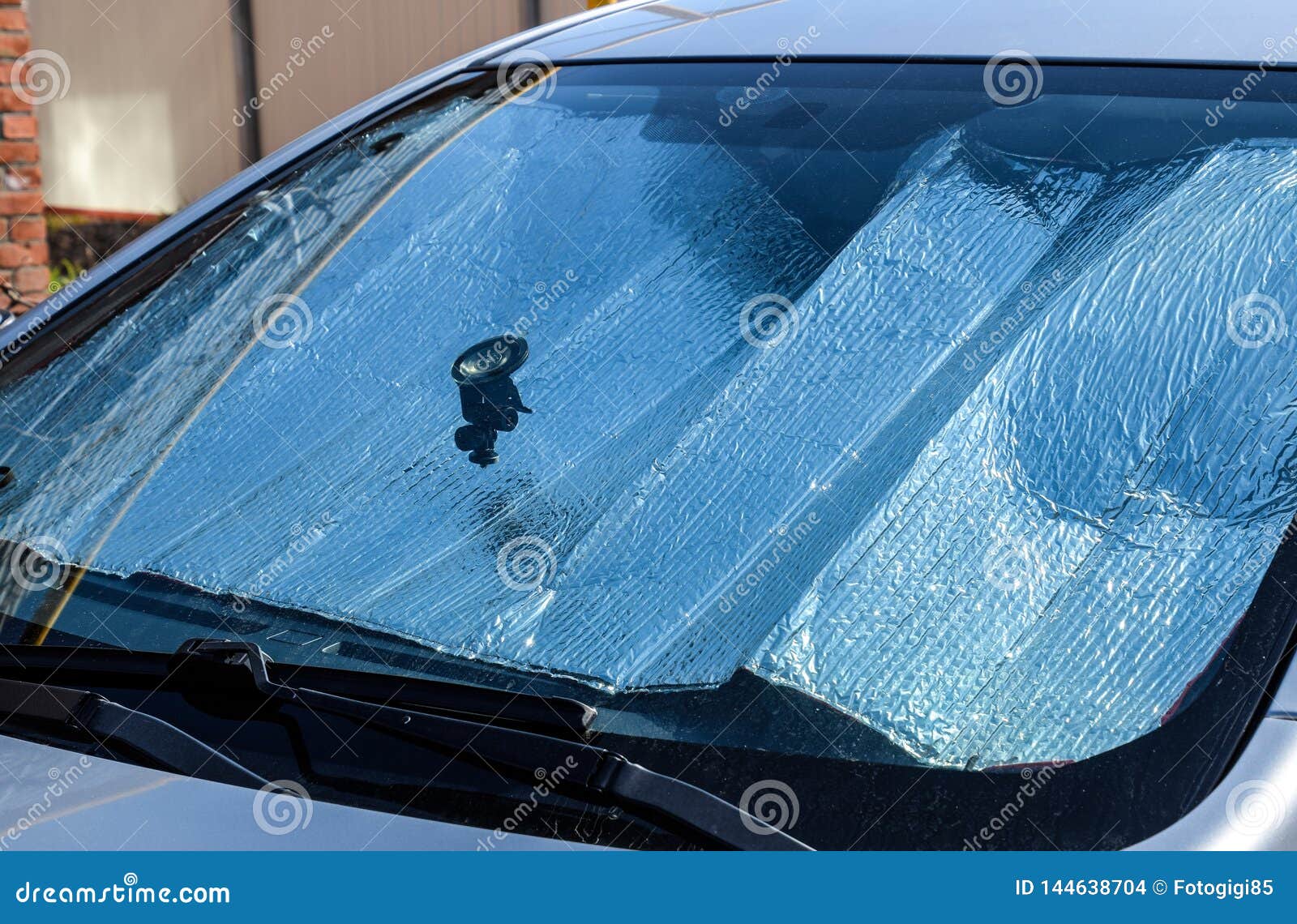 Protection of the Car Panel from Direct Sunlight. Sun Reflector Stock ...