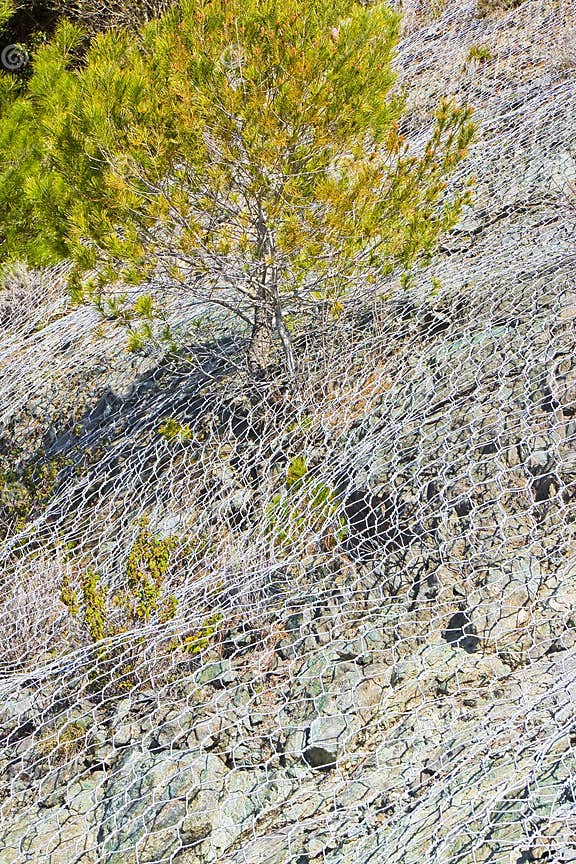 Protection Wire Mesh Against Falling Rocks from the Mountains Stock ...
