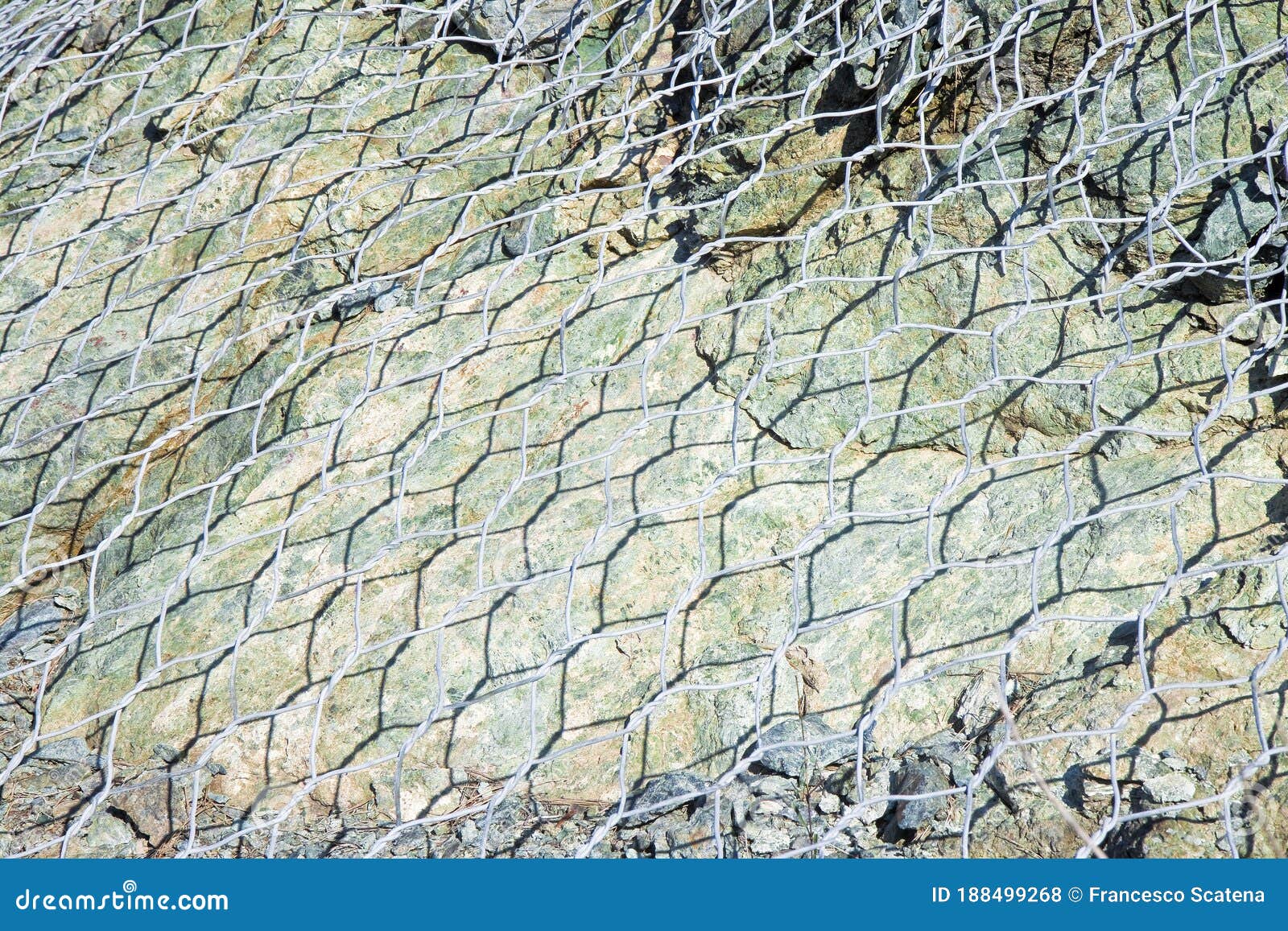 Protection Wire Mesh Against Falling Rocks from the Mountains Stock ...