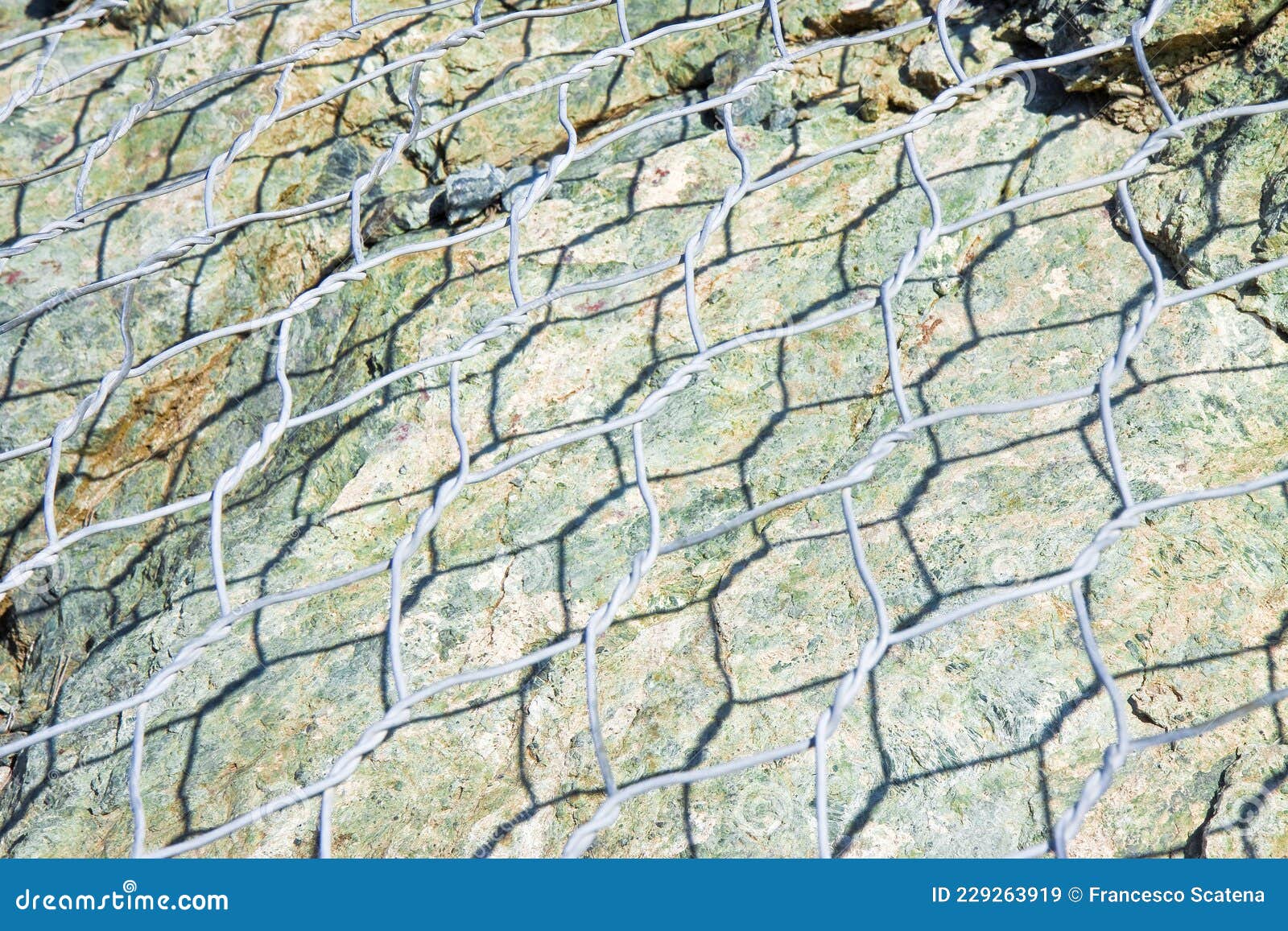 Protection Wire Mesh Against Falling Rocks from the Mountains Stock ...