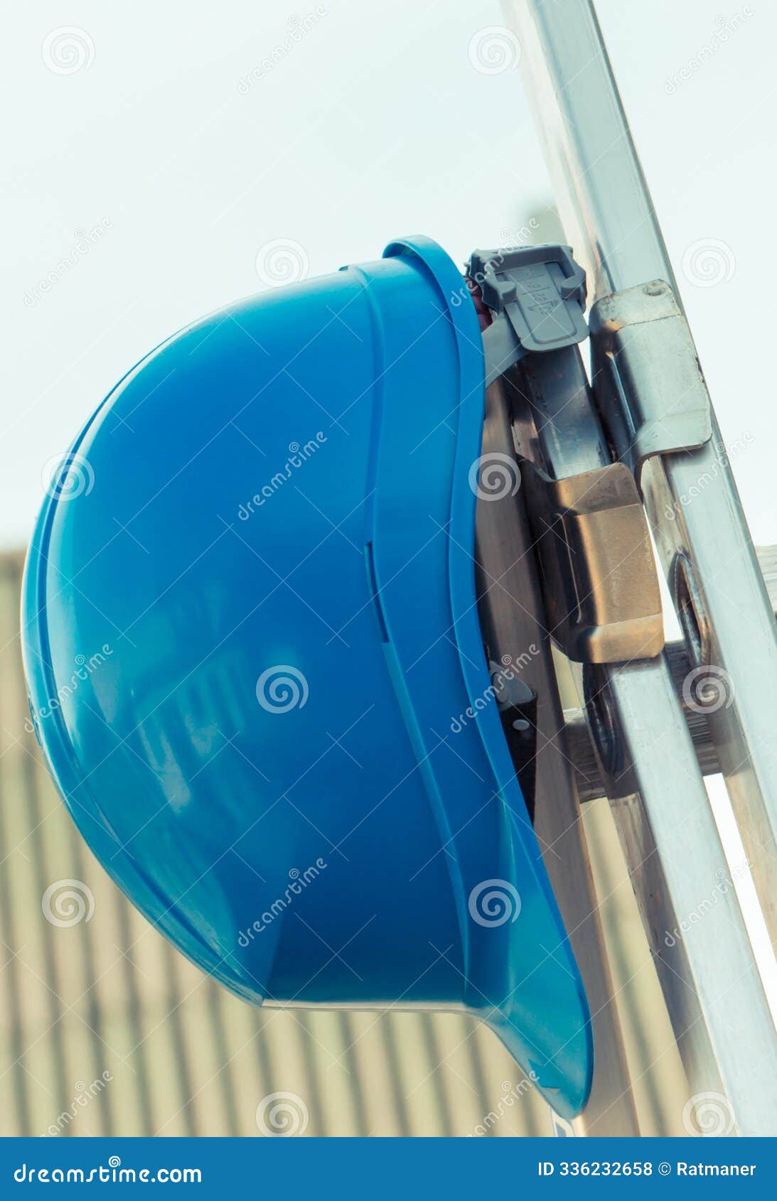 Protective Blue Helmet on Aluminum Ladder. Safety at Work Stock Photo ...