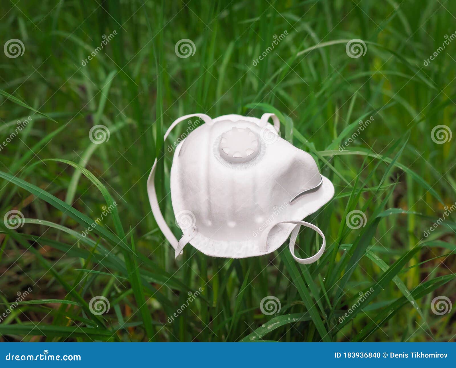 Protective Face Mask on the Grass in the Forest. during the Coronavirus ...