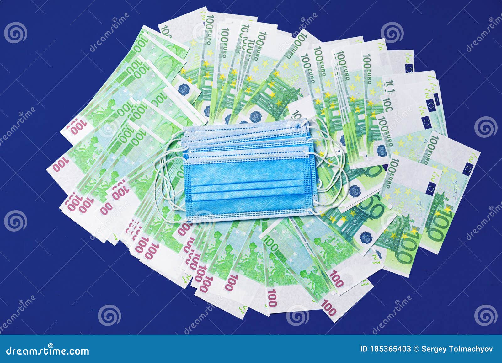 Protective Face Masks on Background of Euro Banknotes Stock Image ...