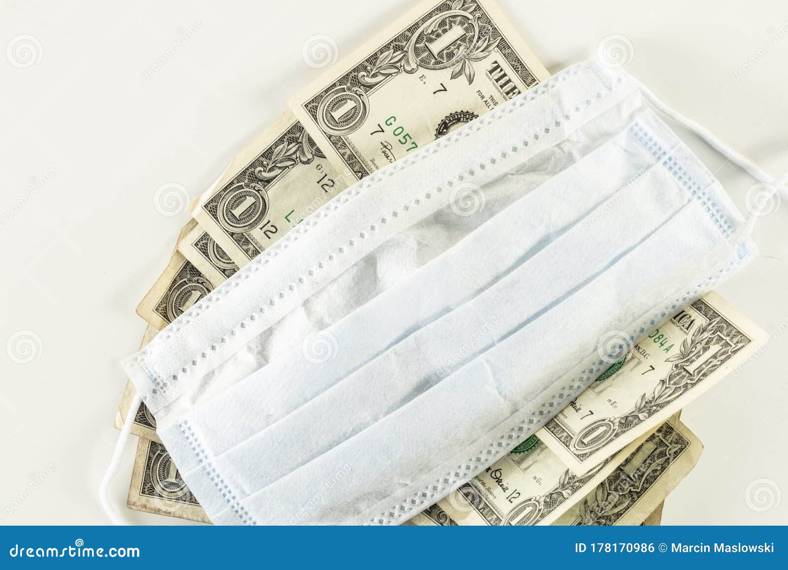 Protective Mask on One Dollar Bill, Concept of Currency Protection ...
