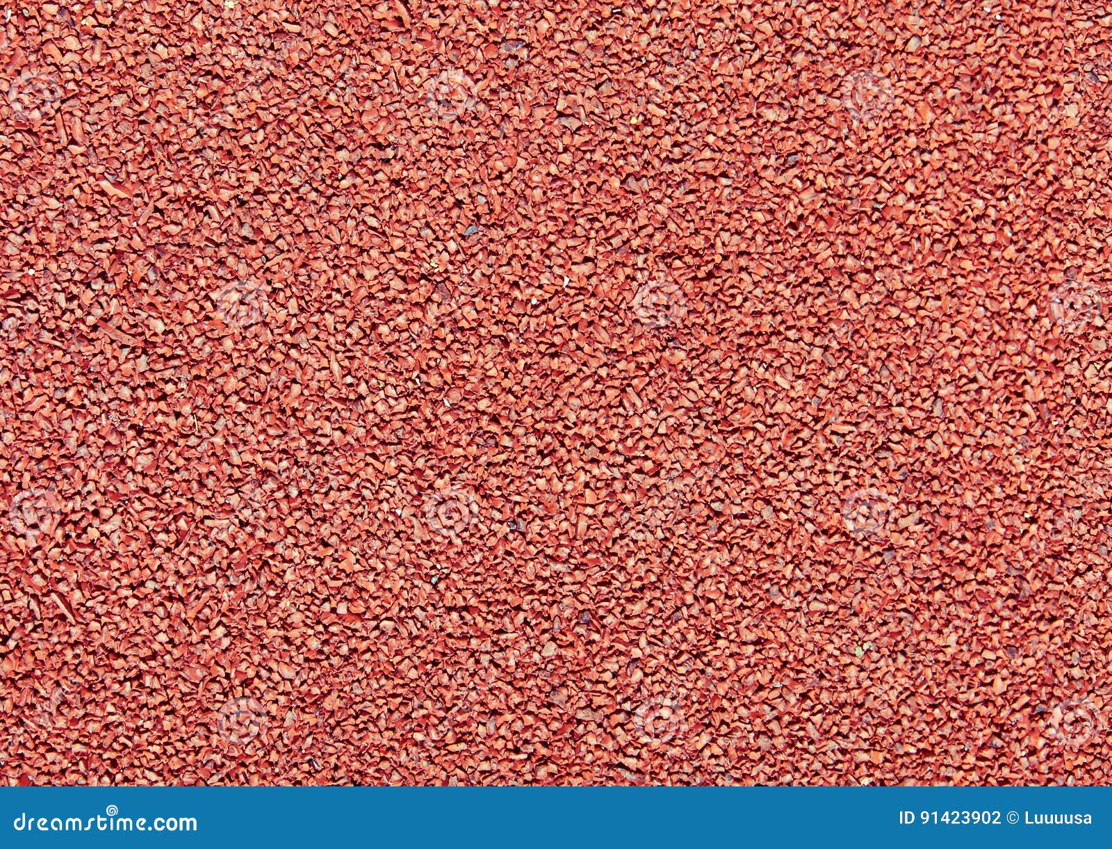 The Protective Red Coating of Crumb Rubber. Texture Safety Rubberized ...
