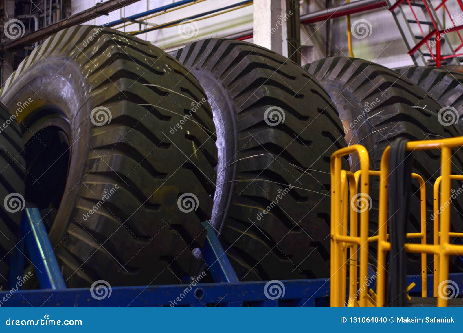 The Protector of a Large Rubber Wheel. Huge Rubber Tire Career Dump ...