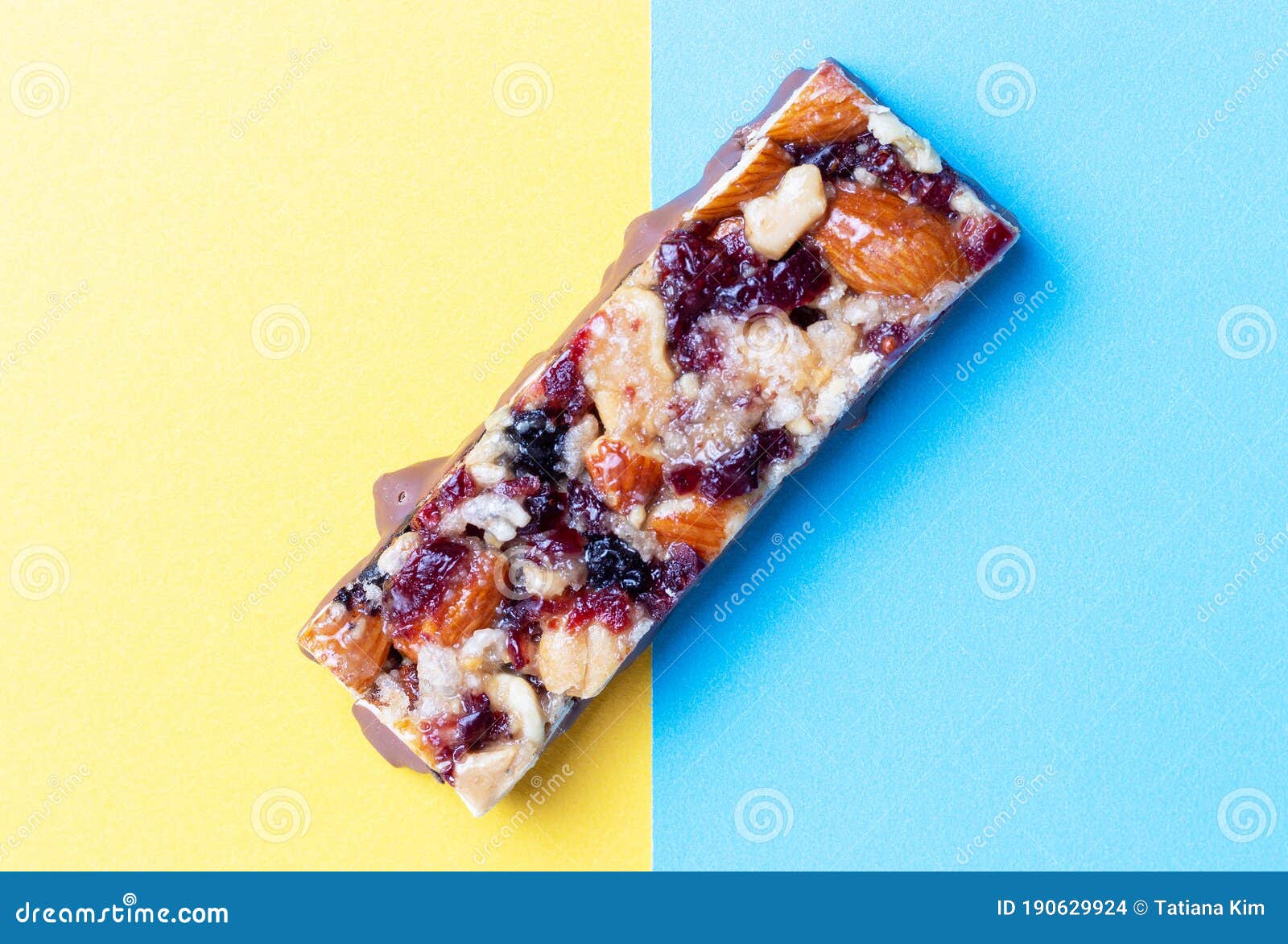 Protein Bar with Cereals on Yellow and Blue Background Stock Photo ...