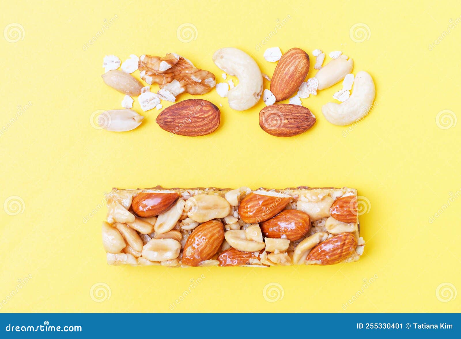 Protein Bars with Nuts on Yellow Background, View from Above. Stock ...