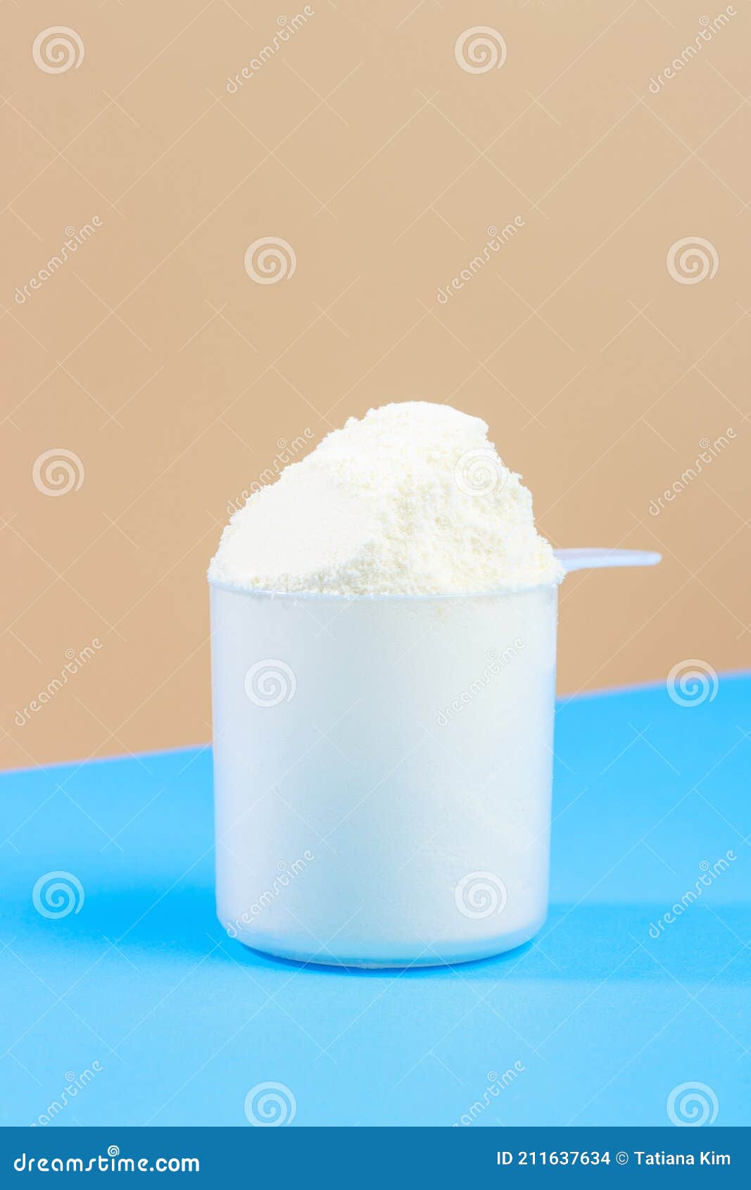 Protein Powder in Scoop Close-up on Blue and Brown Background. Stock ...
