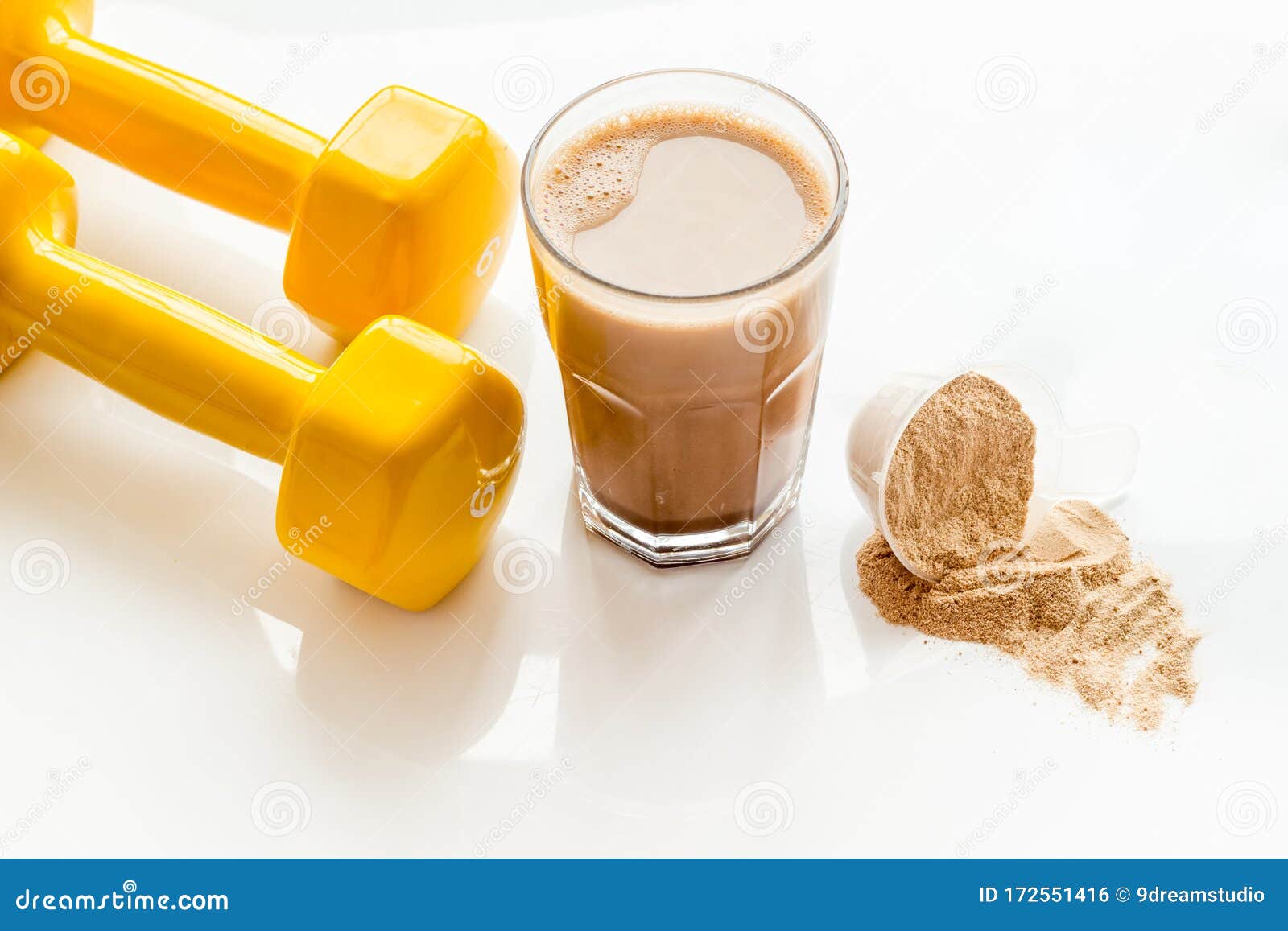 Protein Shake in Glass Near Dumbbells on White Background Stock Photo ...