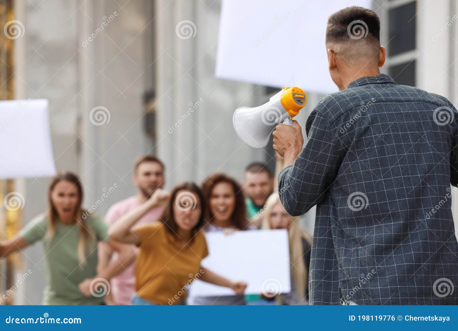 Protest Leader with Megaphone Talking To Crowd Stock Photo - Image of ...