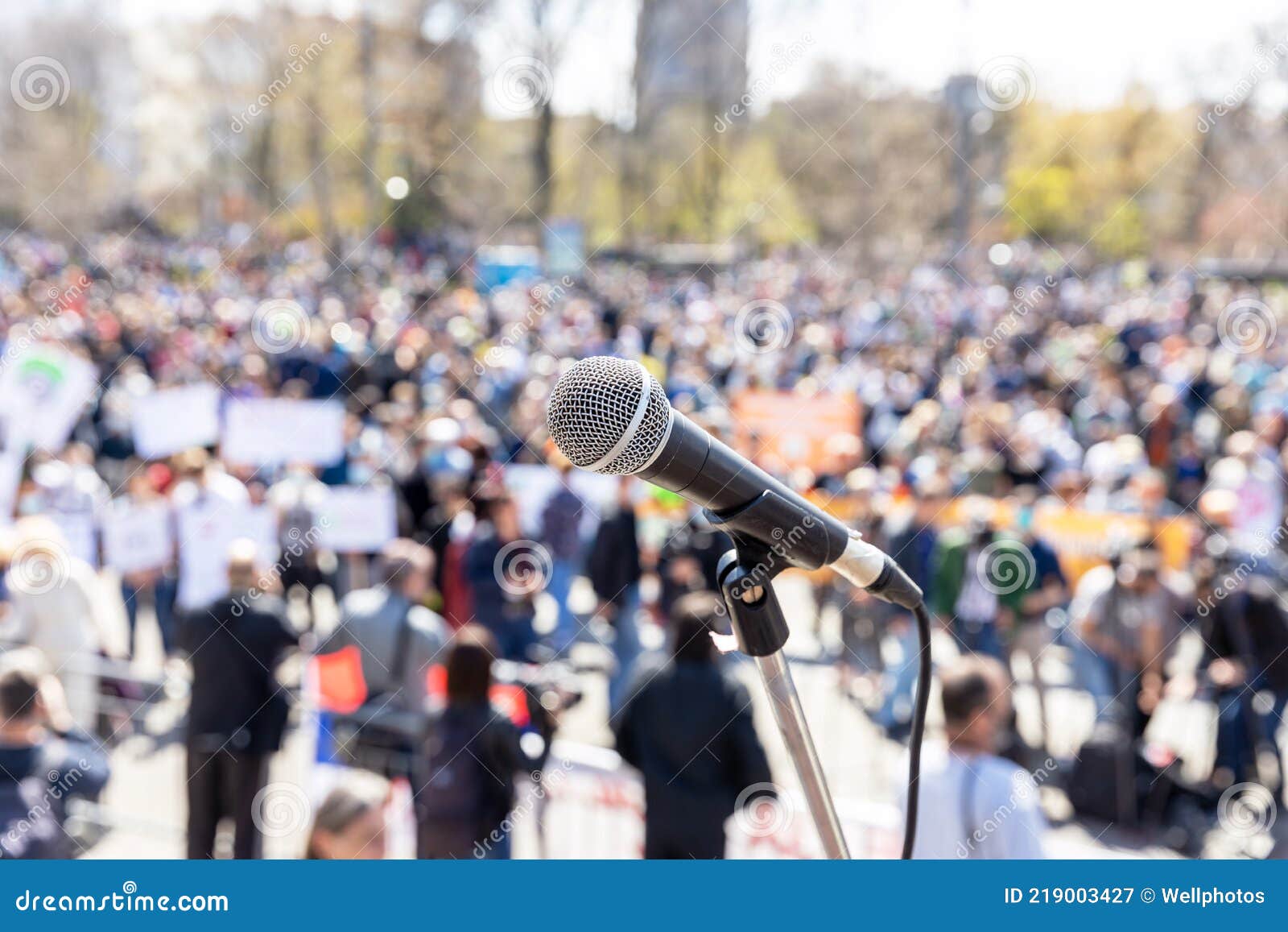 Public Demonstration Or Political Protest. Microphone In Focus Against ...