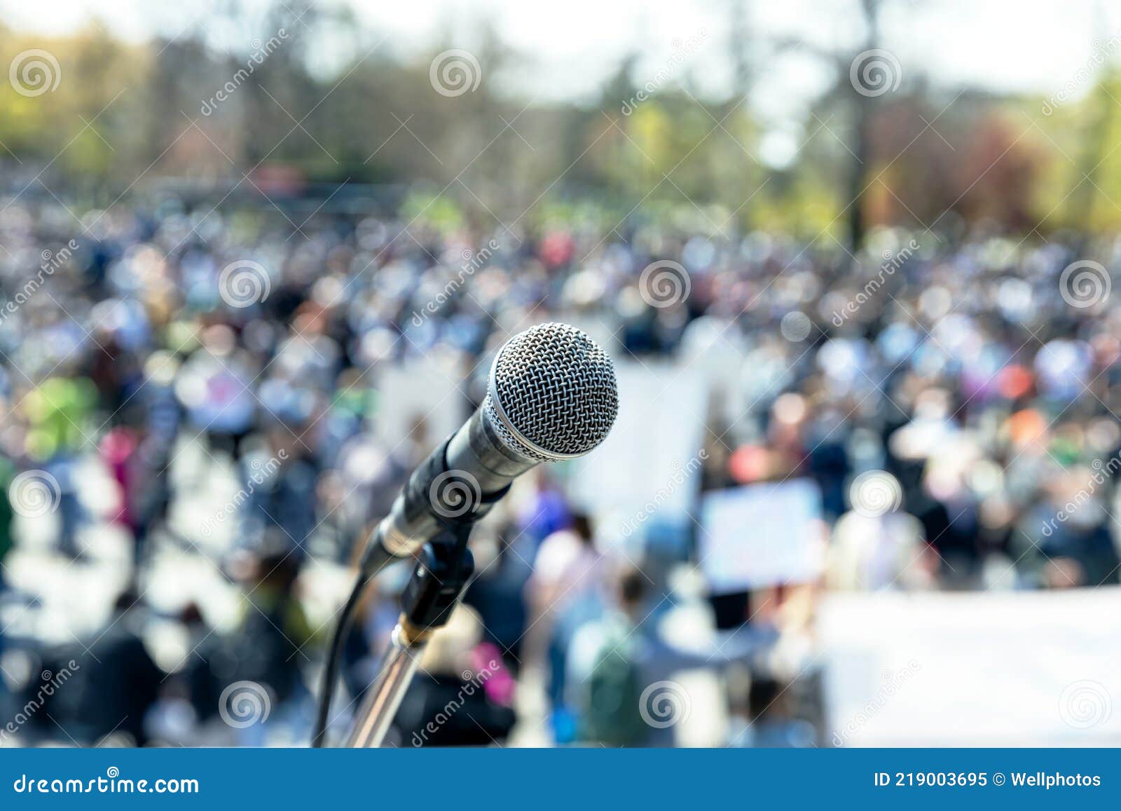 Protest or Public Demonstration, Focus on Microphone, Blurred Group of ...