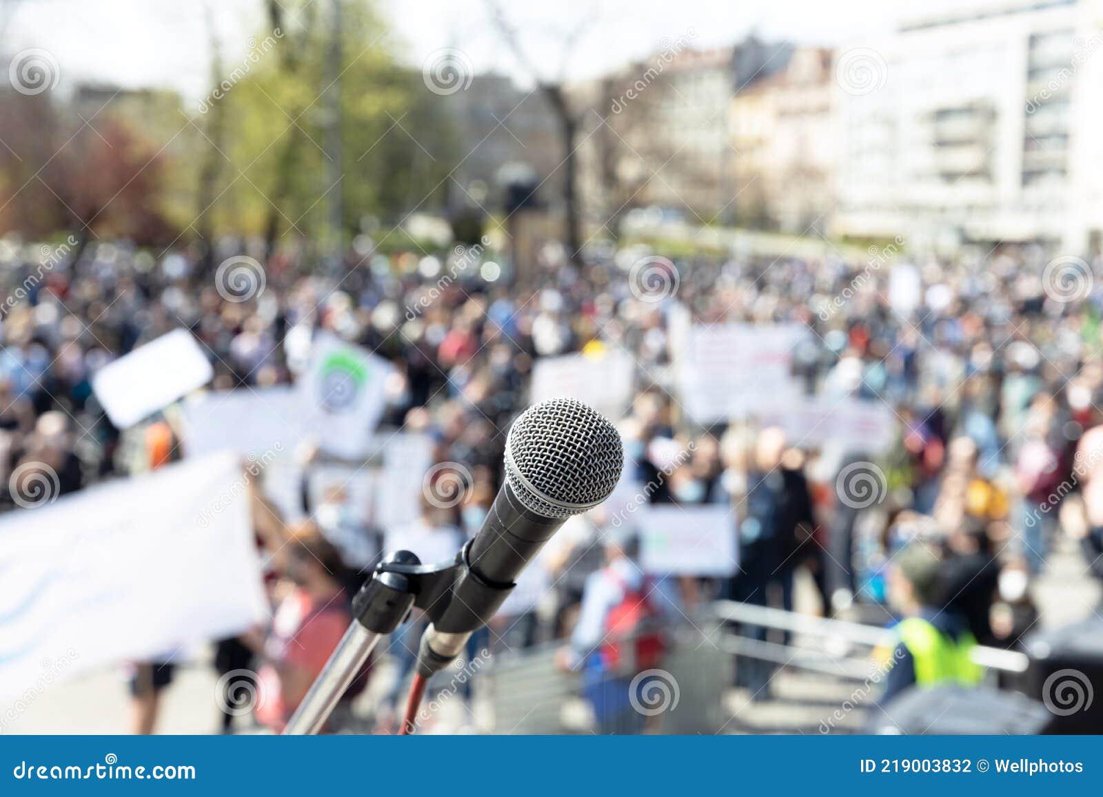 Public Demonstration Or Political Protest. Microphone In Focus Against ...