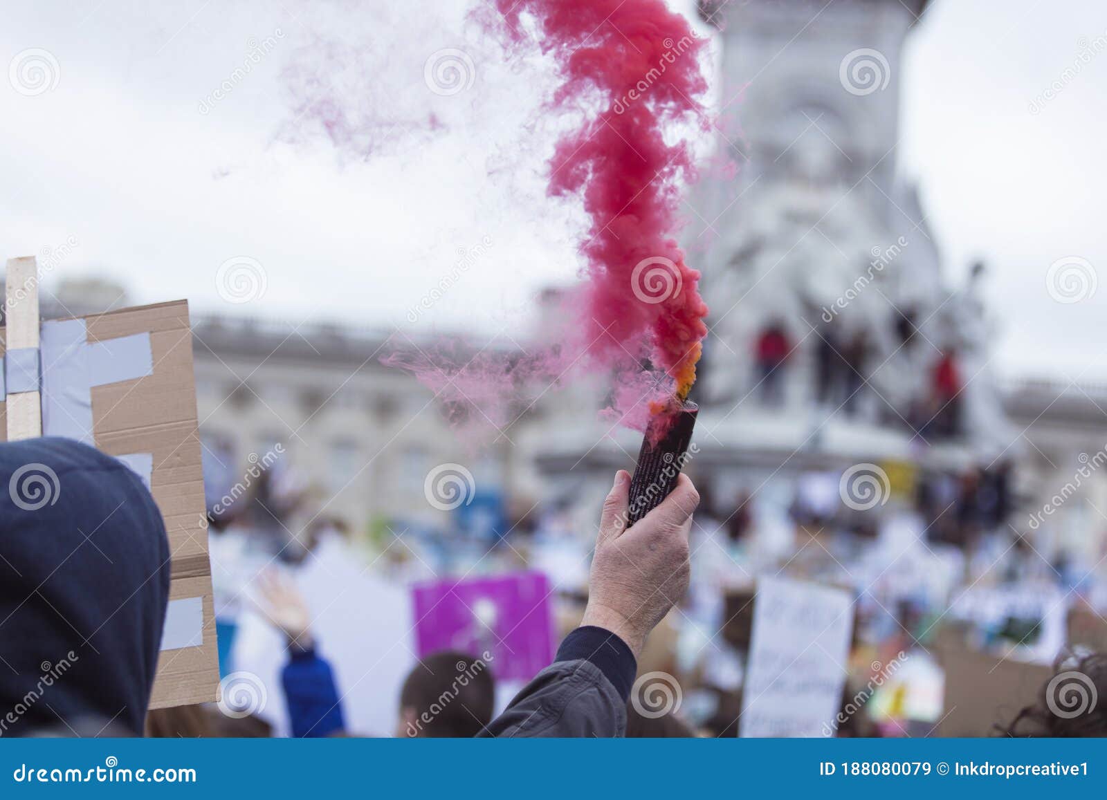 A Protestor Holds a Smoke Bomb at a Political Demonstration Stock Image ...