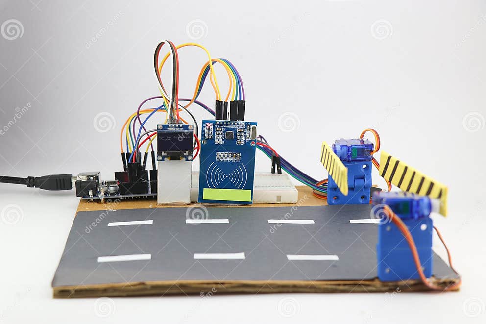 Prototype Of Automatic Toll Collection System Using Rfid Sensor And