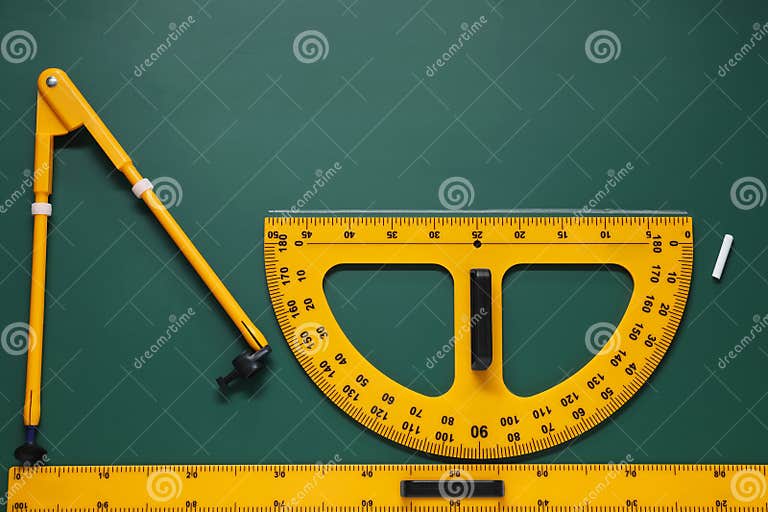 Protractor, Compass, Chalk and Ruler on Green Chalkboard, Flat Lay ...