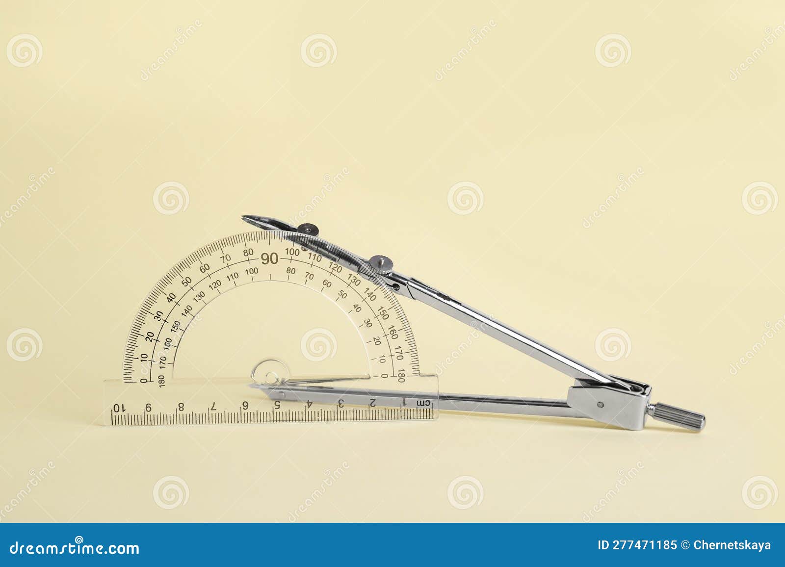 Protractor and Metal Compass on Yellow Background Stock Image - Image ...