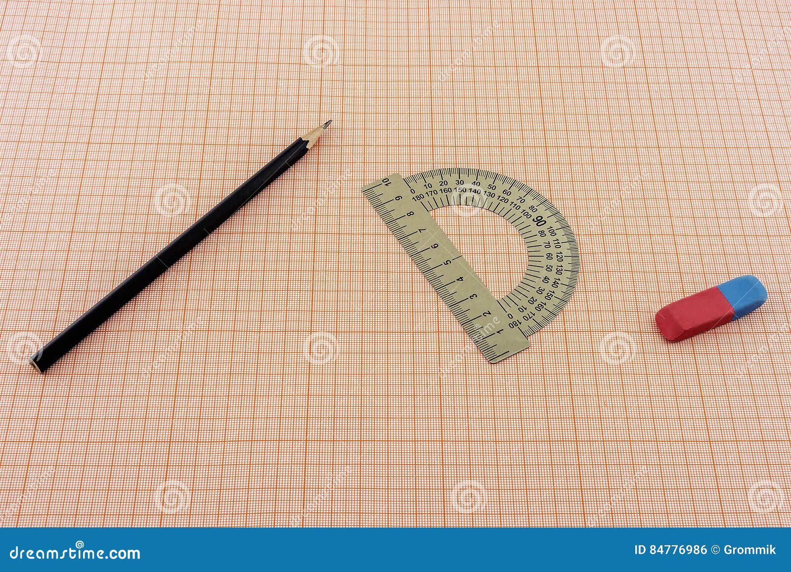 Protractor, Pencil and Eraser Lying on a Sheet of Graph Paper Stock ...
