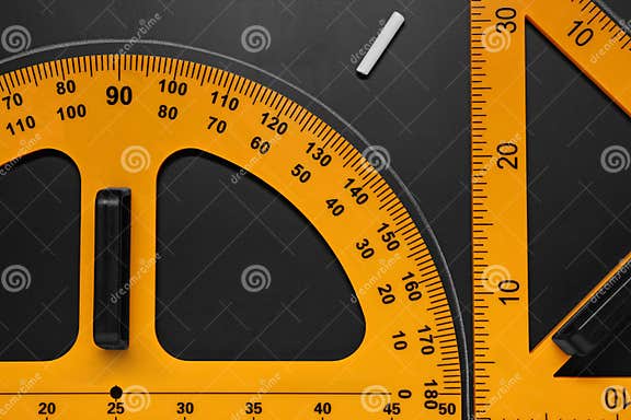 Protractor, Triangle Ruler and Chalk on Black Table, Flat Lay Stock ...