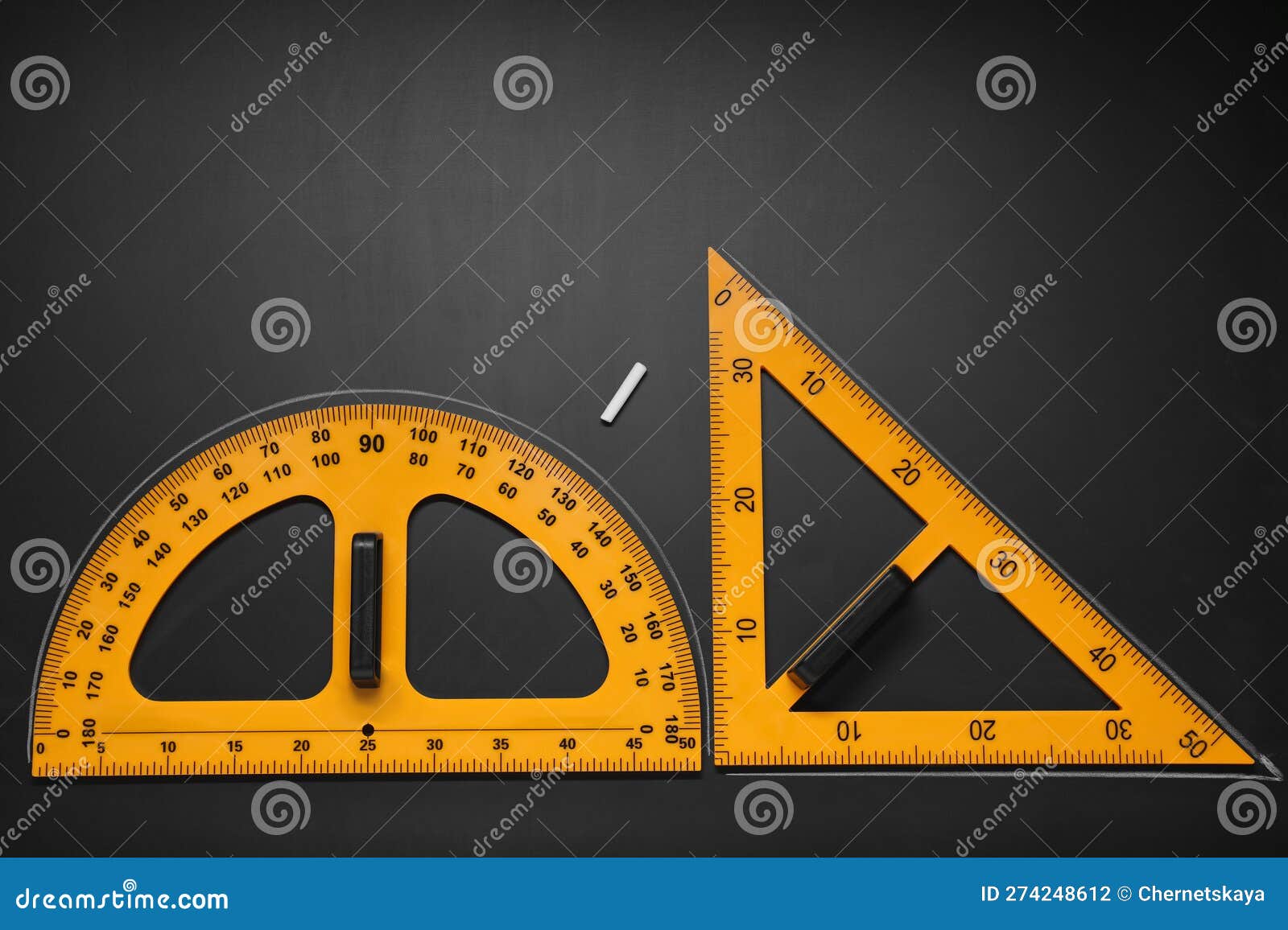 Protractor, Triangle Ruler and Chalk on Black Table, Flat Lay. Space ...