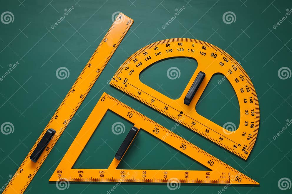 Protractor, Triangle and Ruler on Green Chalkboard, Flat Lay Stock ...