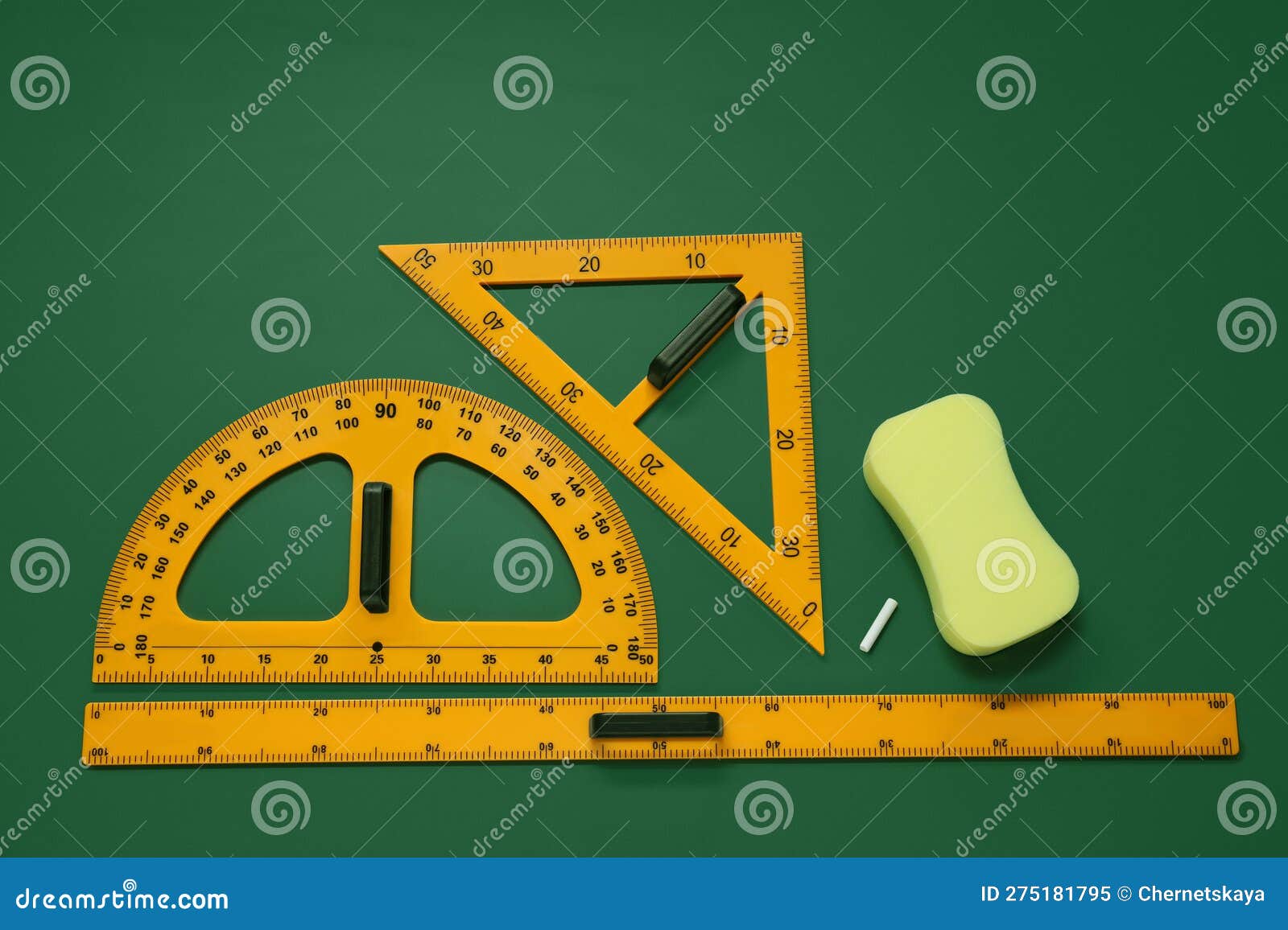 Protractor, Triangle, Ruler and Sponge on Green Chalkboard, Flat Lay ...