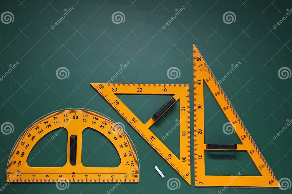 Protractor, Triangles and Chalk on Green Chalkboard, Flat Lay Stock ...