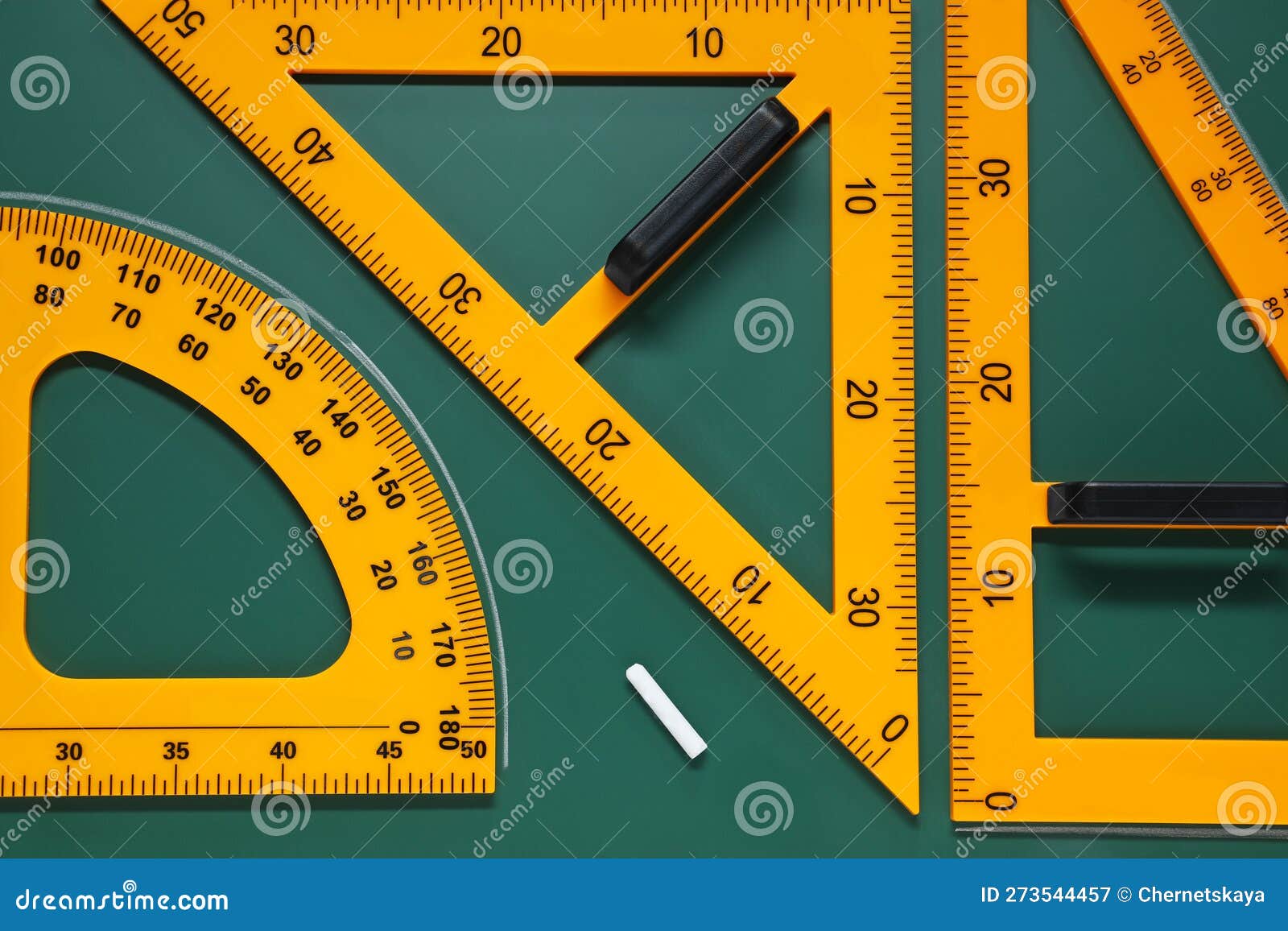 Protractor, Triangles and Chalk on Green Chalkboard, Flat Lay Stock ...