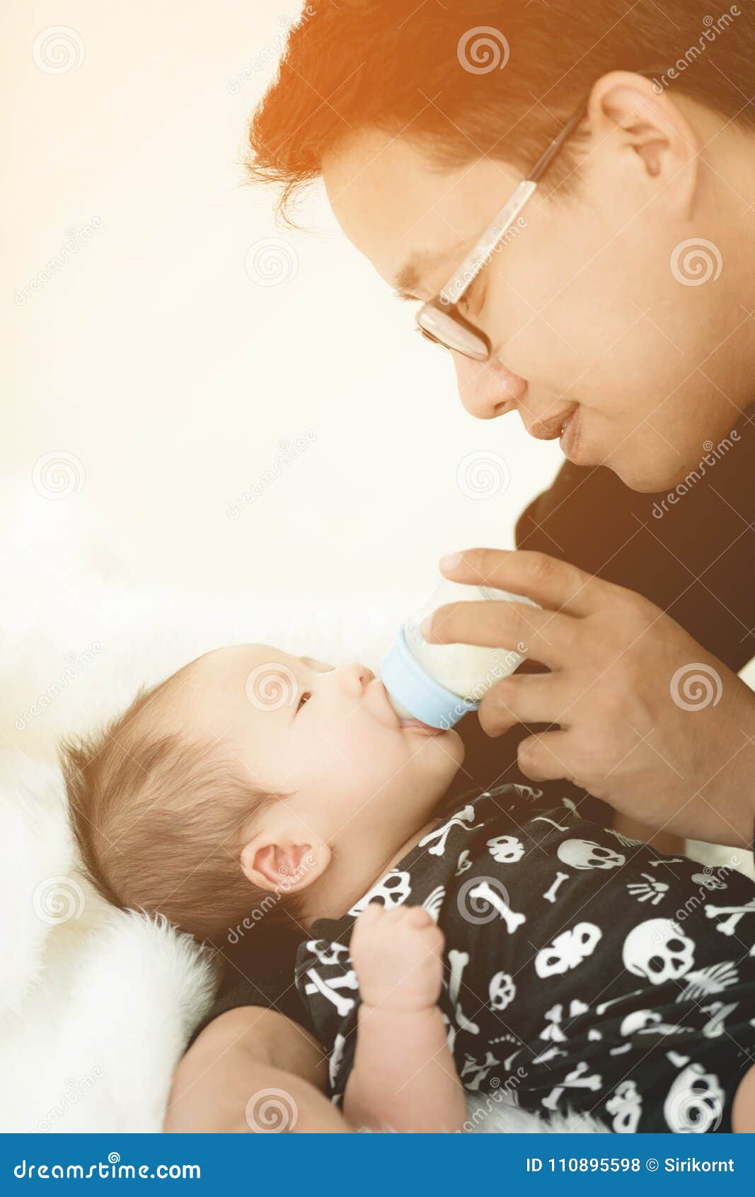 Proud Asian Father Holding His Newborn Baby at Home. Stock Photo ... Proud Asian Father Holding His Newborn Baby at Home. Stock Photo ...