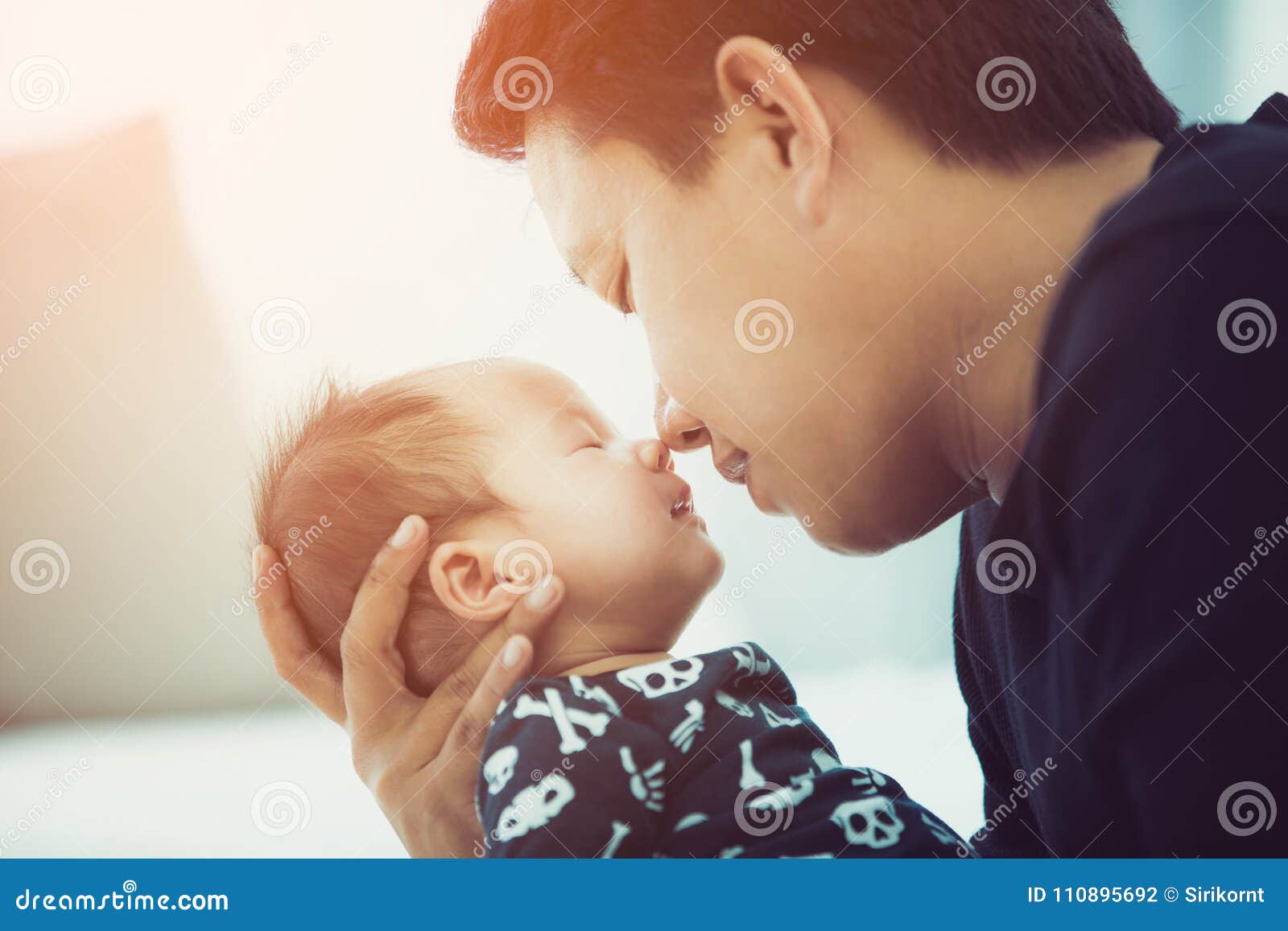 Proud Asian Father Holding His Newborn Baby at Home. Stock Photo ... Proud Asian Father Holding His Newborn Baby at Home. Stock Photo ...
