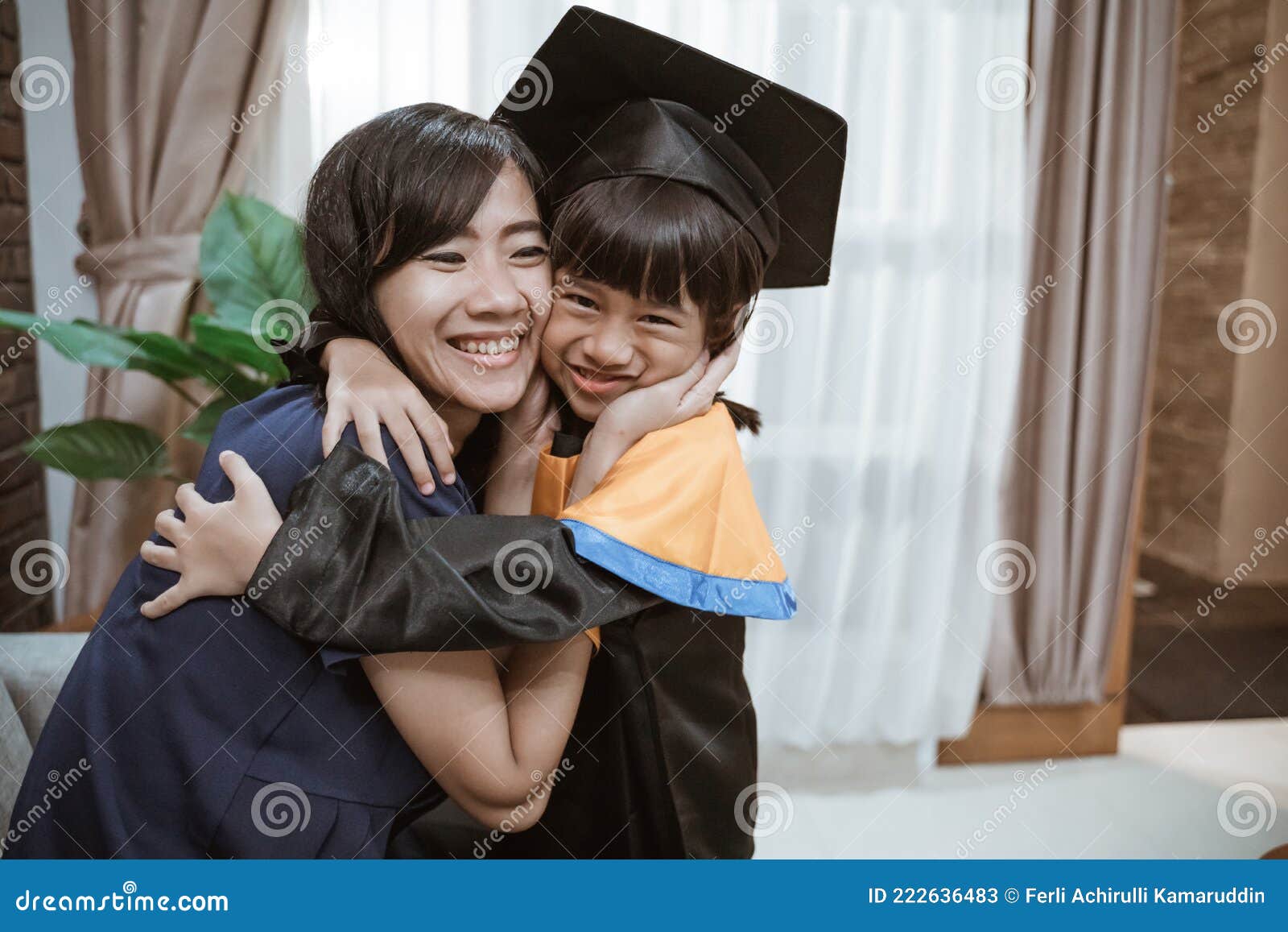 Proud Asian Mother Embrace Her Daughter During Elementary School
