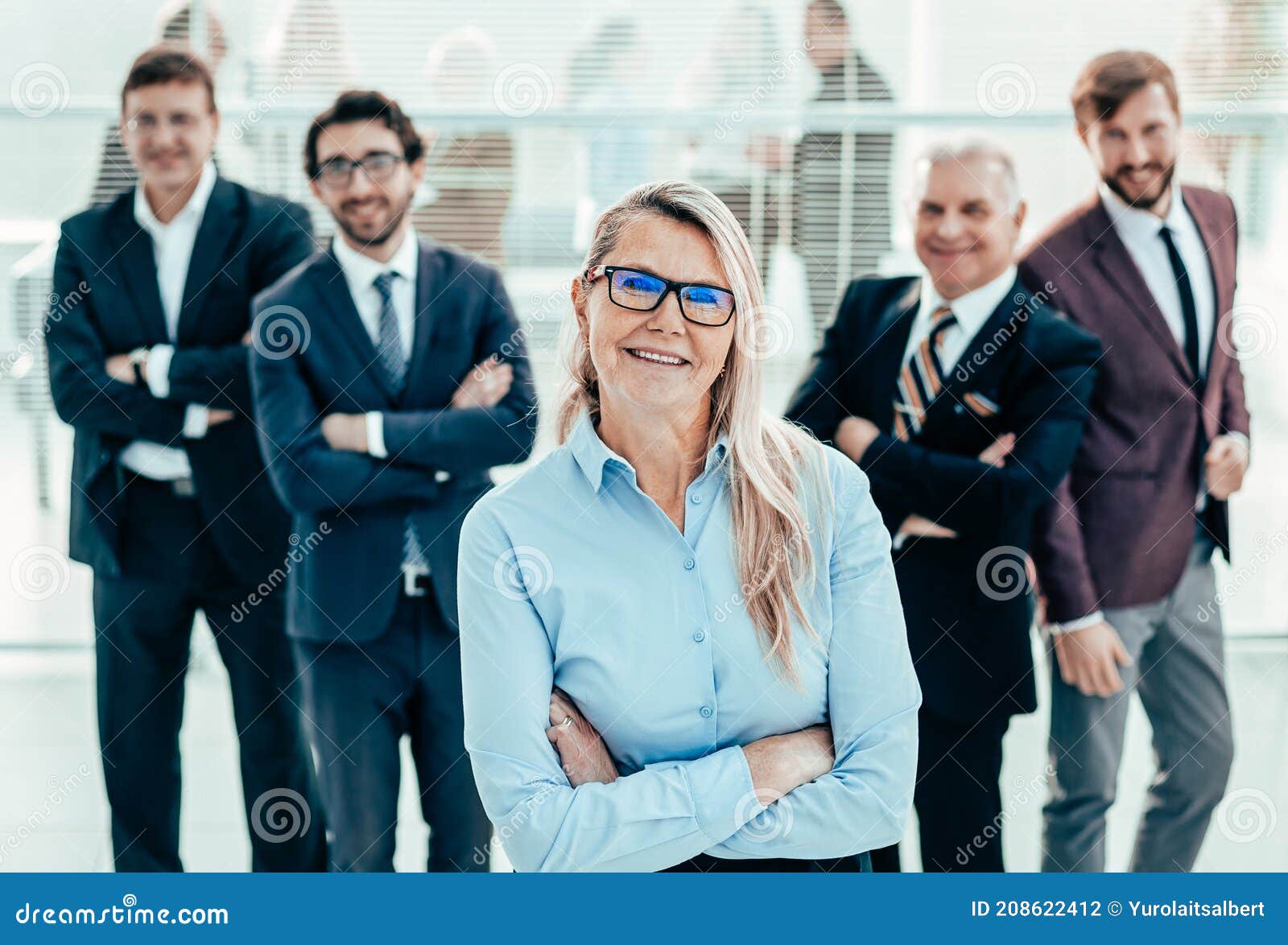Proud Business Woman Standing in Front of a Business Team Stock Photo ... Proud Business Woman Standing in Front of a Business Team Stock Photo ...