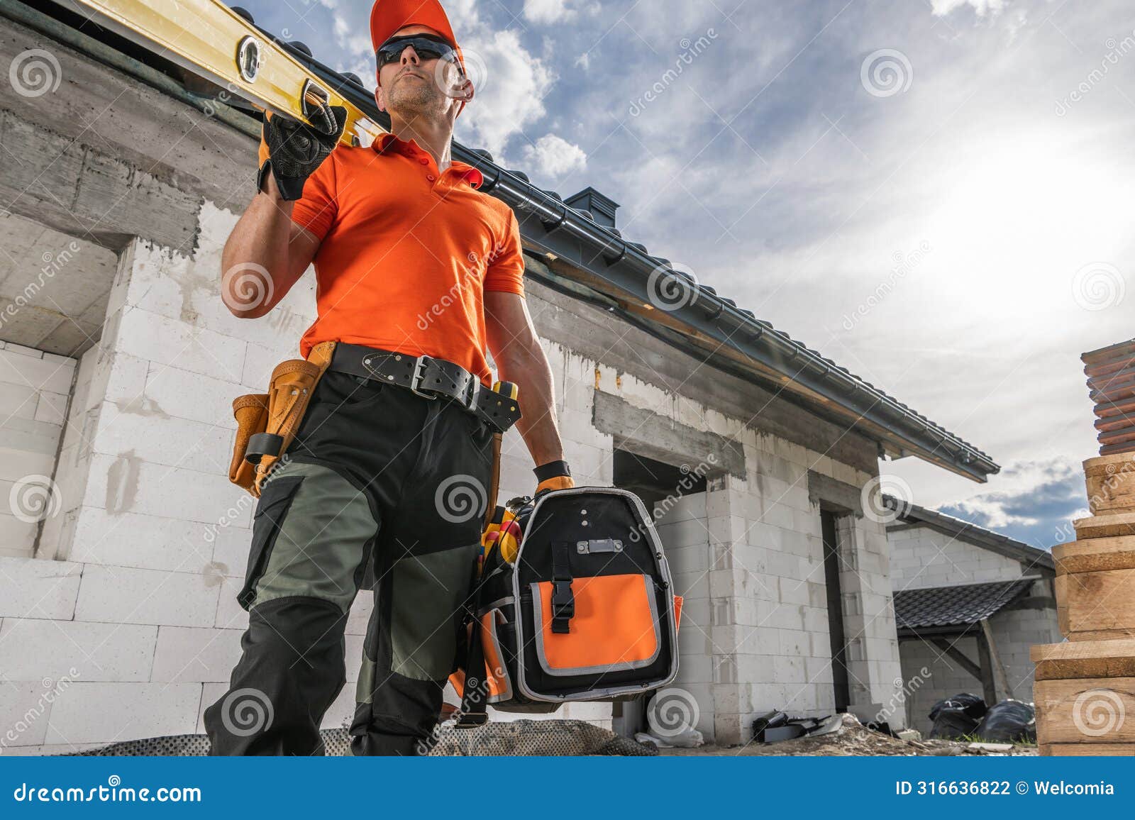 Proud Construction Worker with a Spirit Level on His Shoulder Stock ...