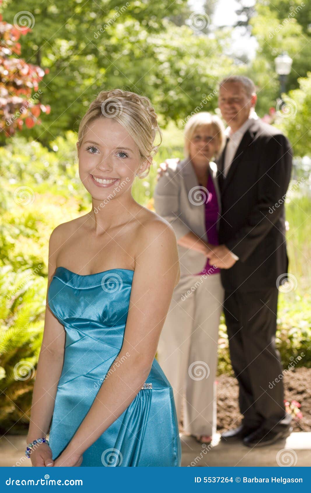 Proud parents. stock photo. Image of gown, lady, blond - 5537264