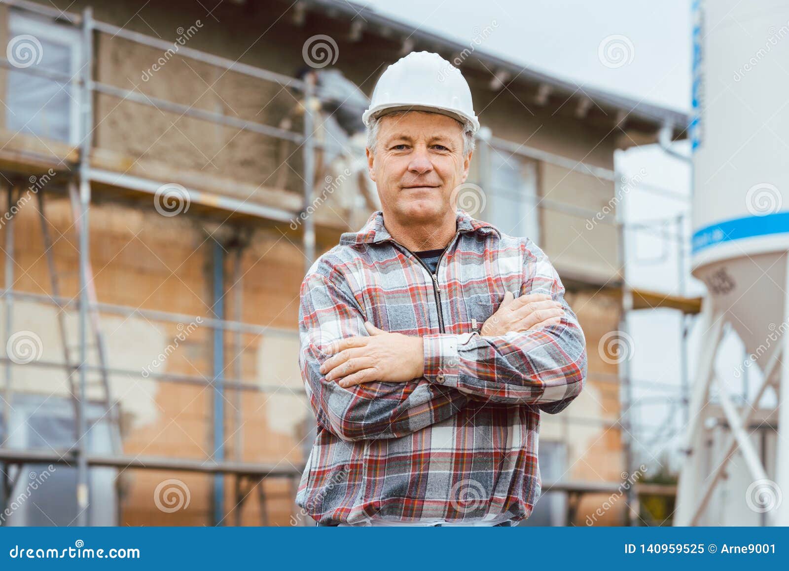 Proud Plasterer Standing in Front of Scaffold on Construction Site ...