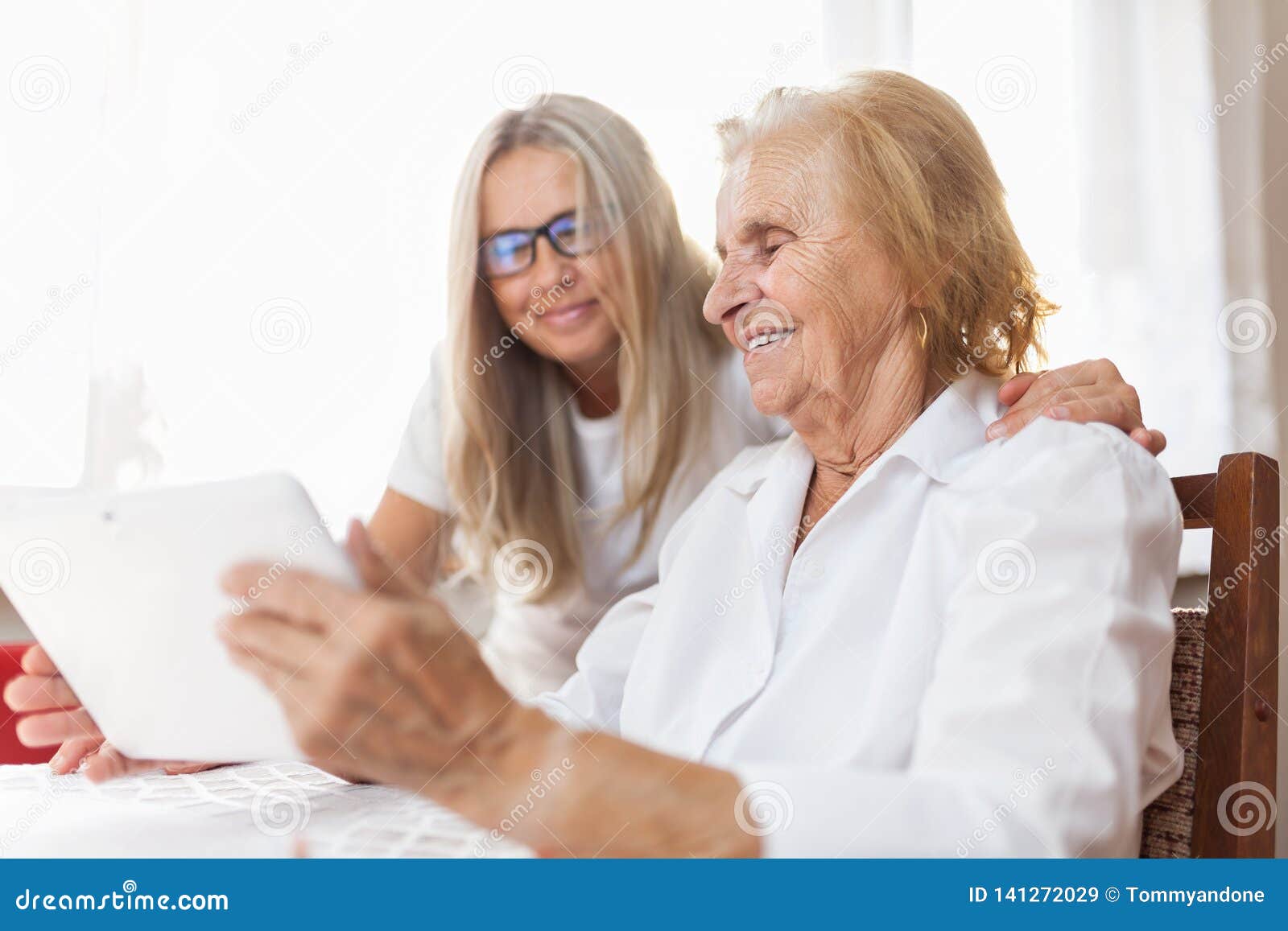 Providing care for elderly stock image. Image of family - 141272029