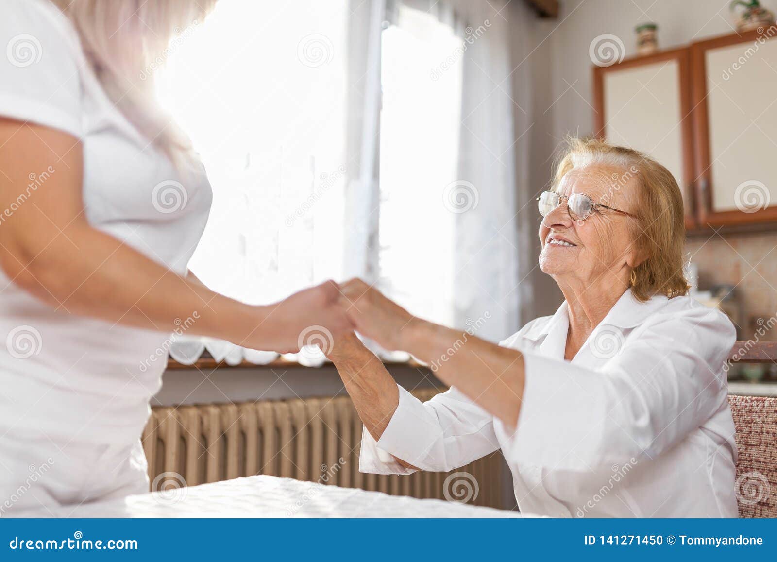 Providing care for elderly stock photo. Image of family - 141271450
