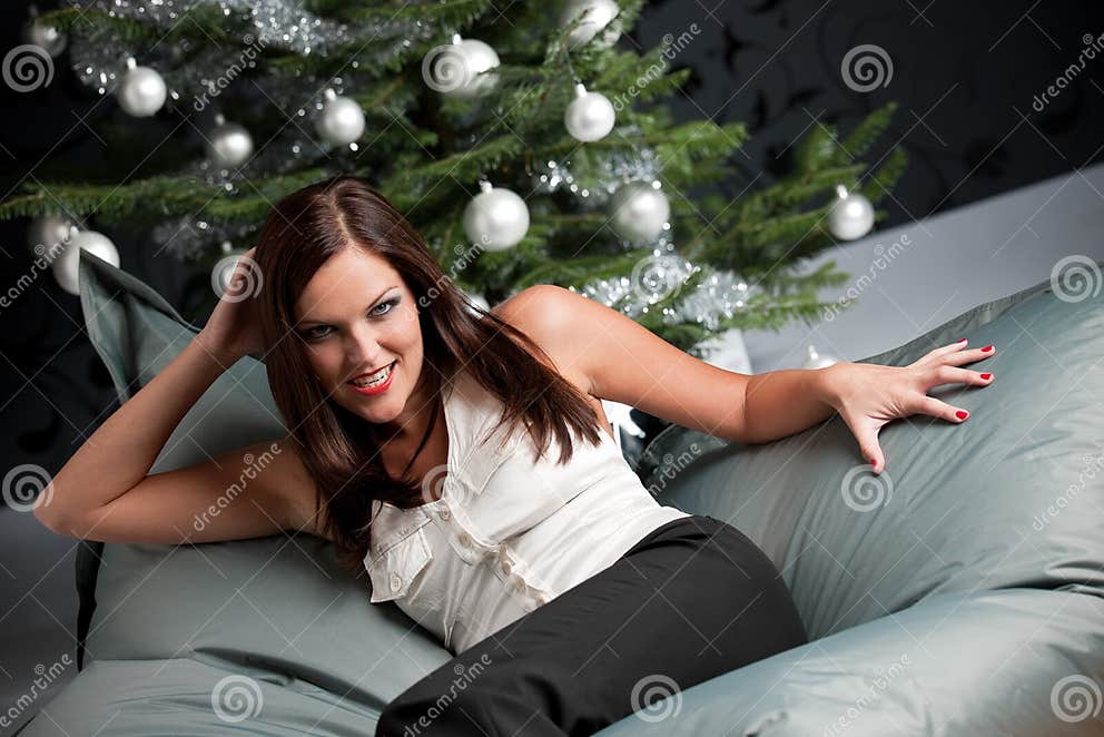 Provocative Woman in Front of Christmas Tree Stock Image - Image of ...