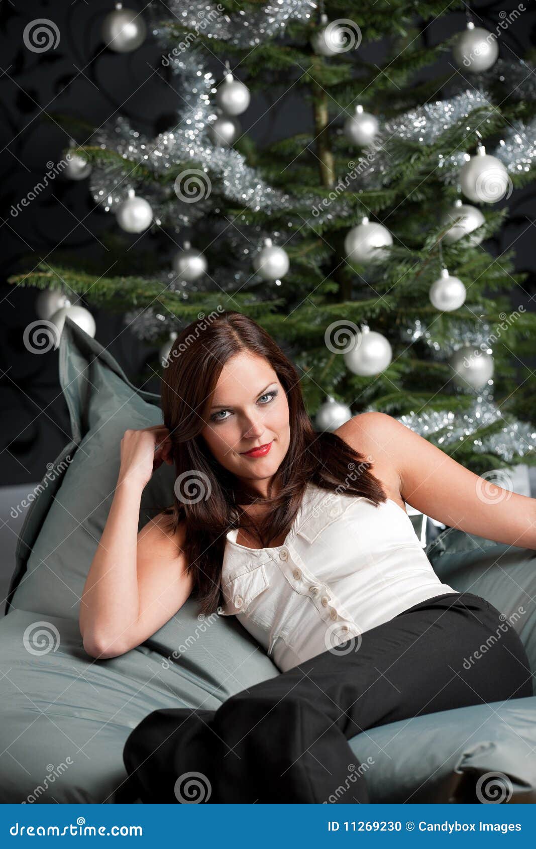 Provocative Woman in Front of Christmas Tree Stock Photo - Image of ...
