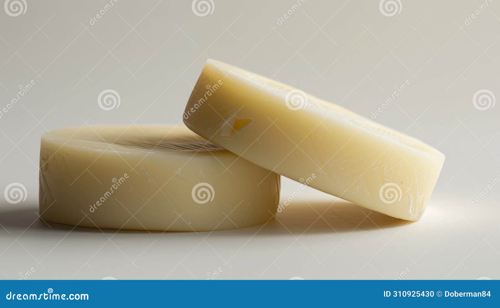Provolone Cheese Wheels on a Plain White Backdrop, Highlighting Texture ...